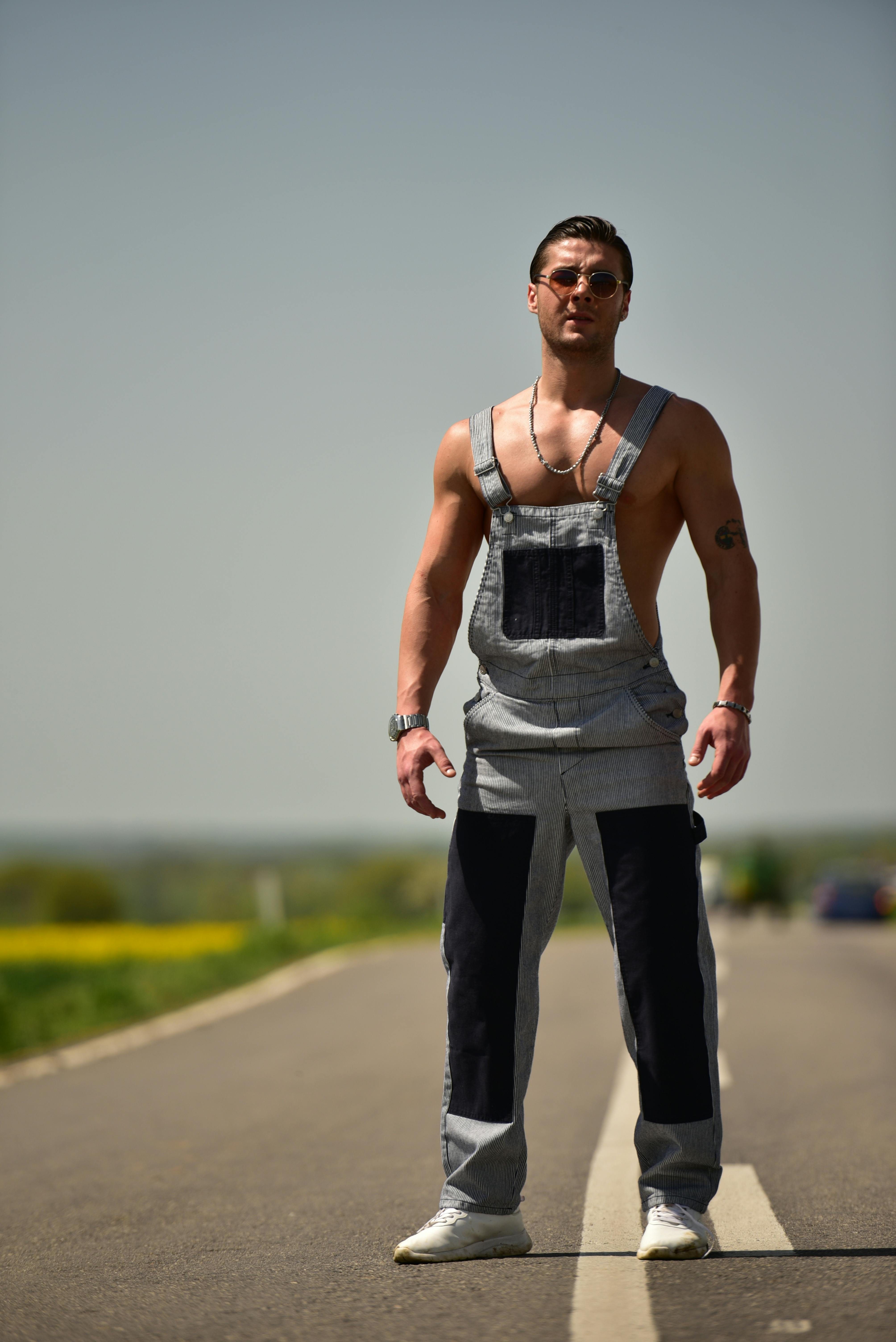 Photo of a Man in a Denim Jumper · Free Stock Photo