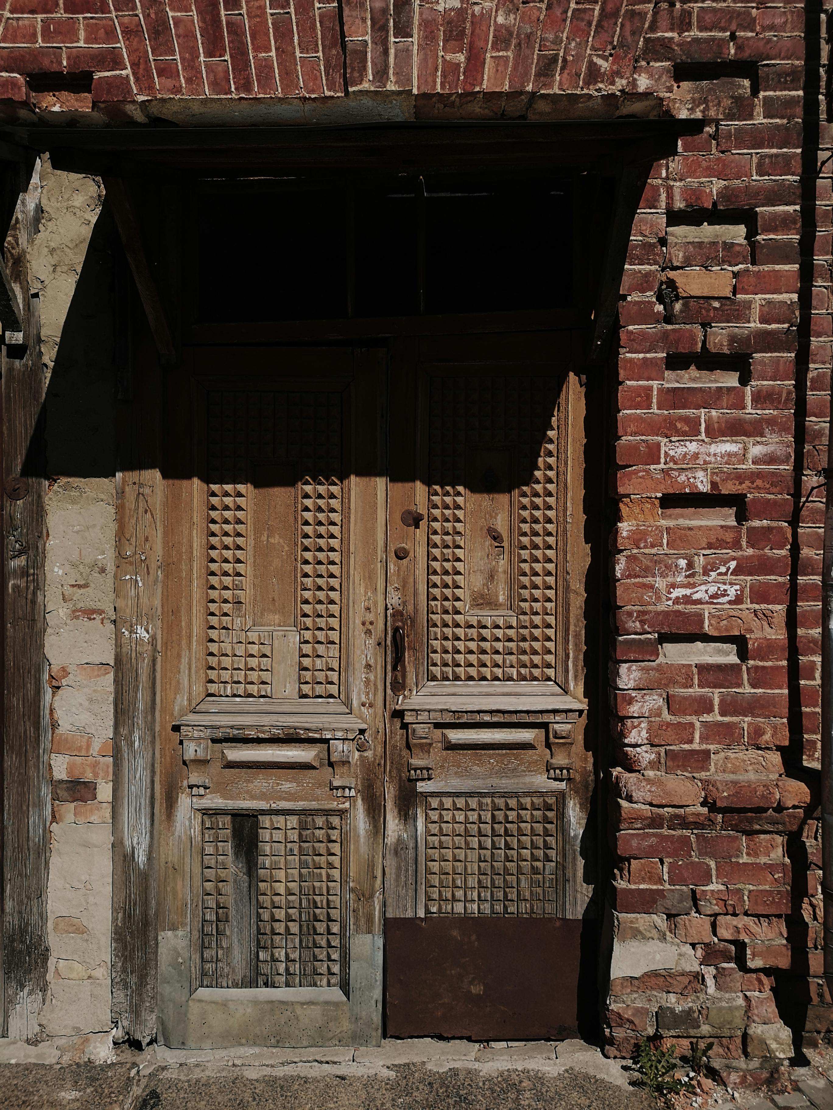 Sunlit Wall around House Door · Free Stock Photo