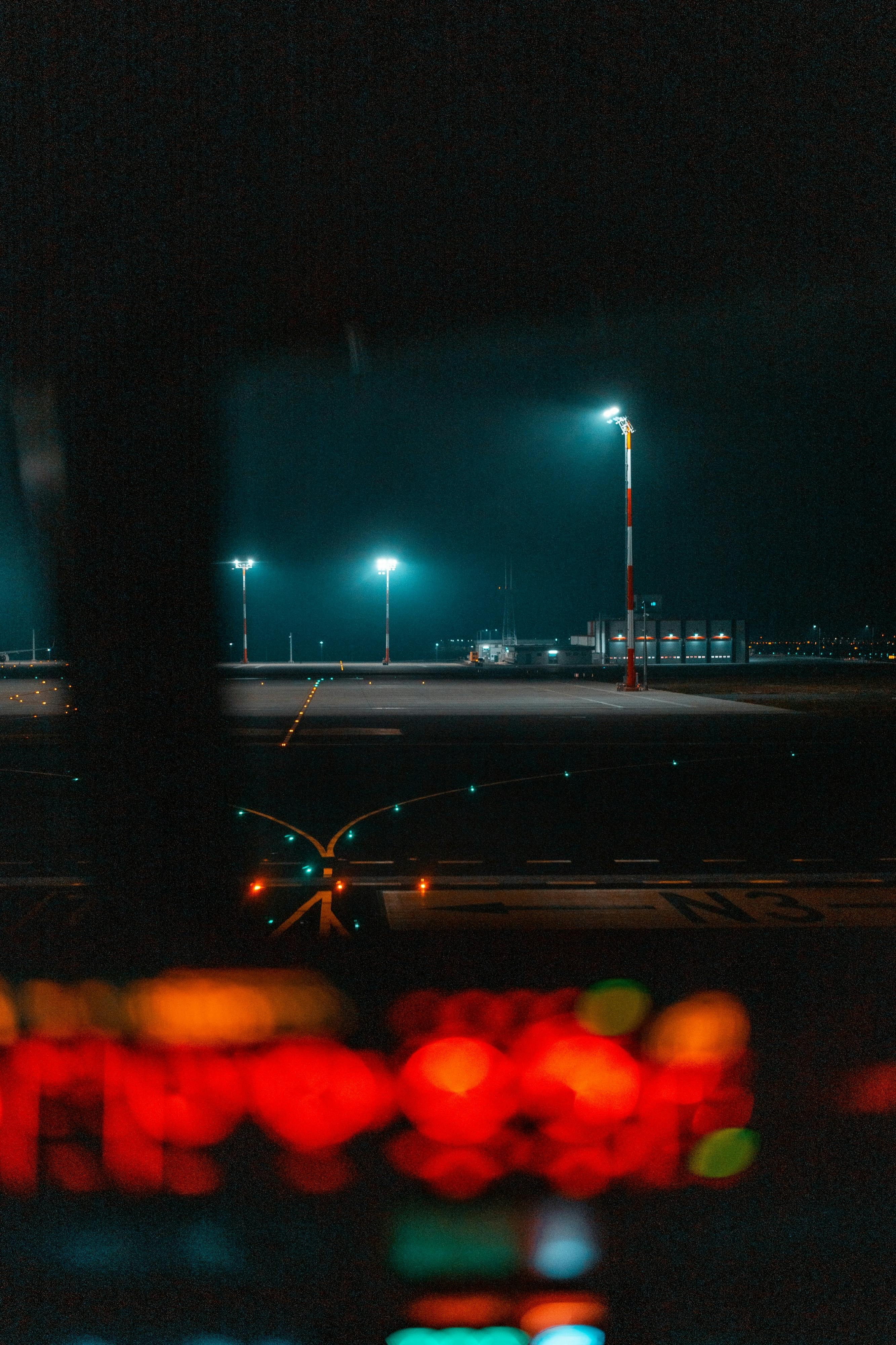 Street Lights Illuminating a Dark Road at Night · Free Stock Photo
