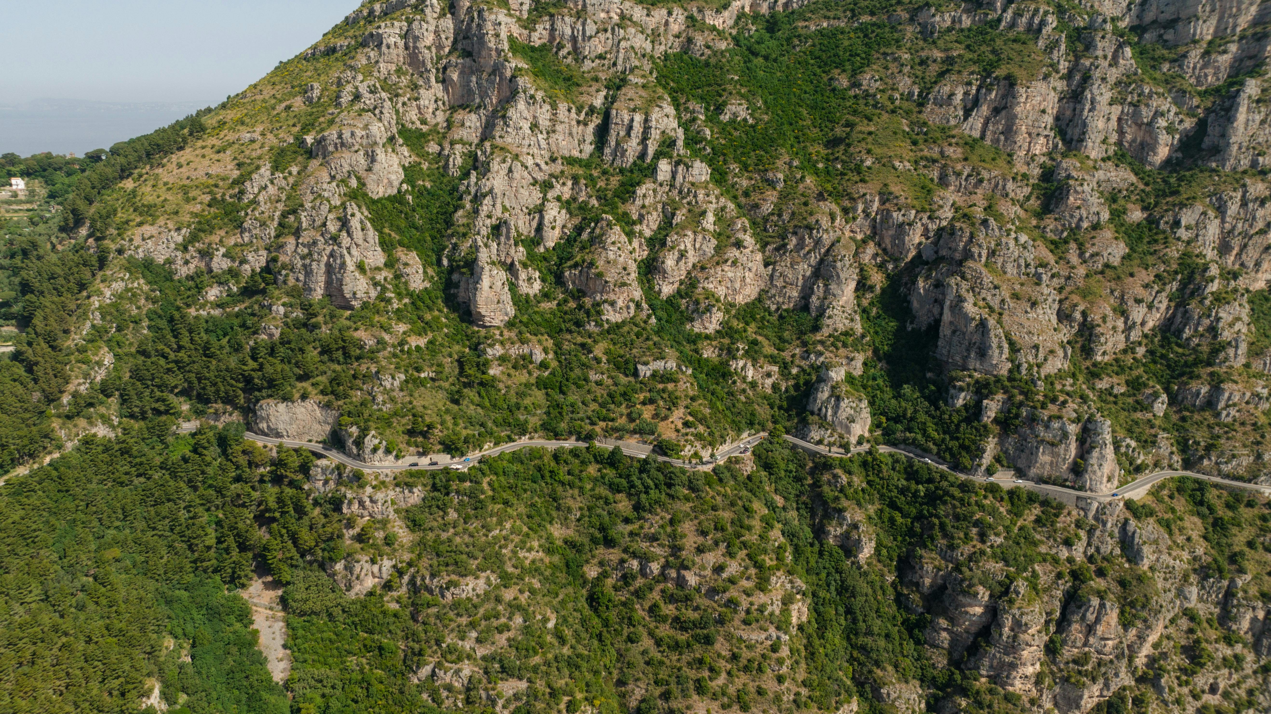Mountainside and a Road · Free Stock Photo