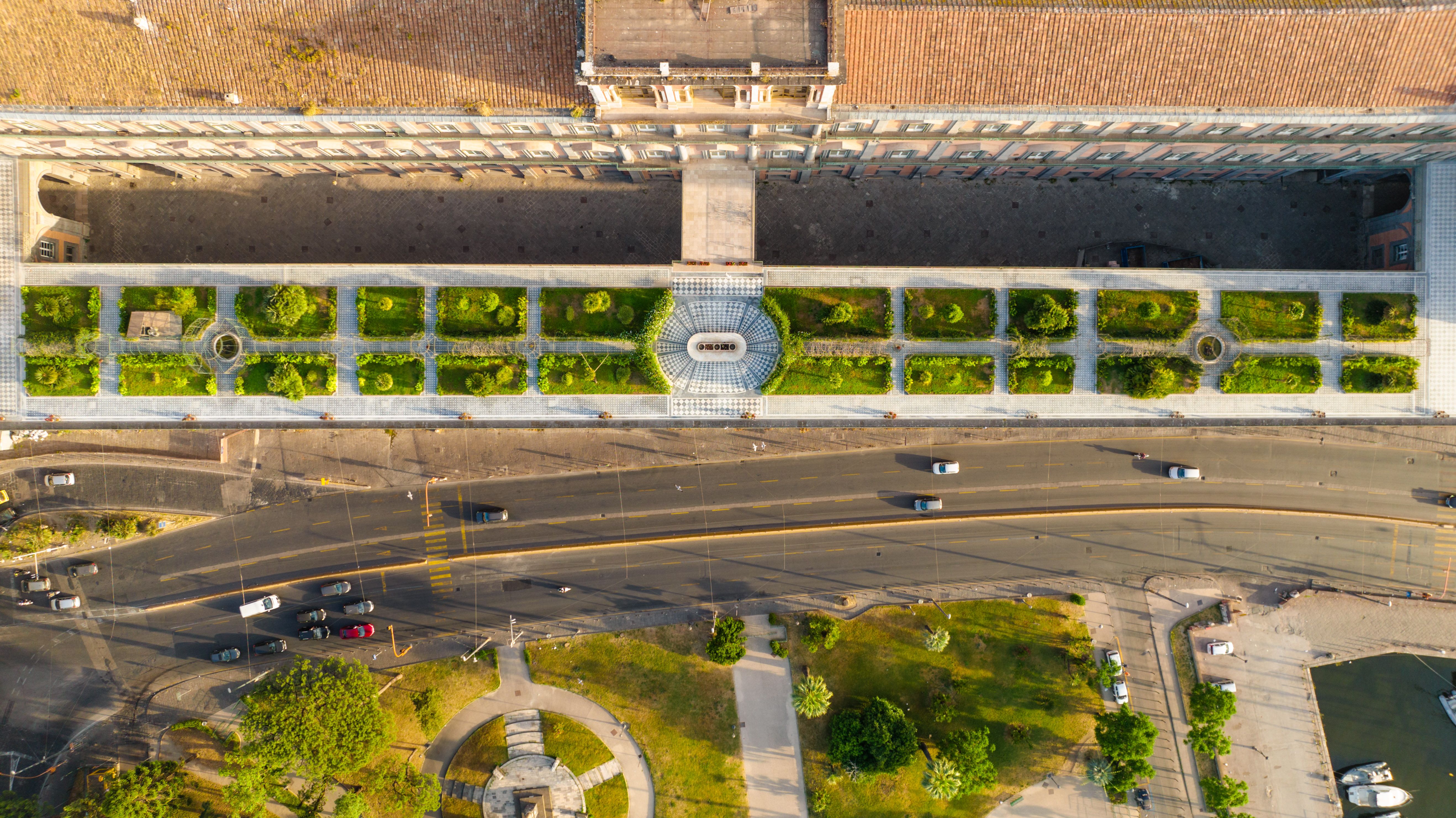 Aerial View of Road by Large Buil · Free Stock Photo