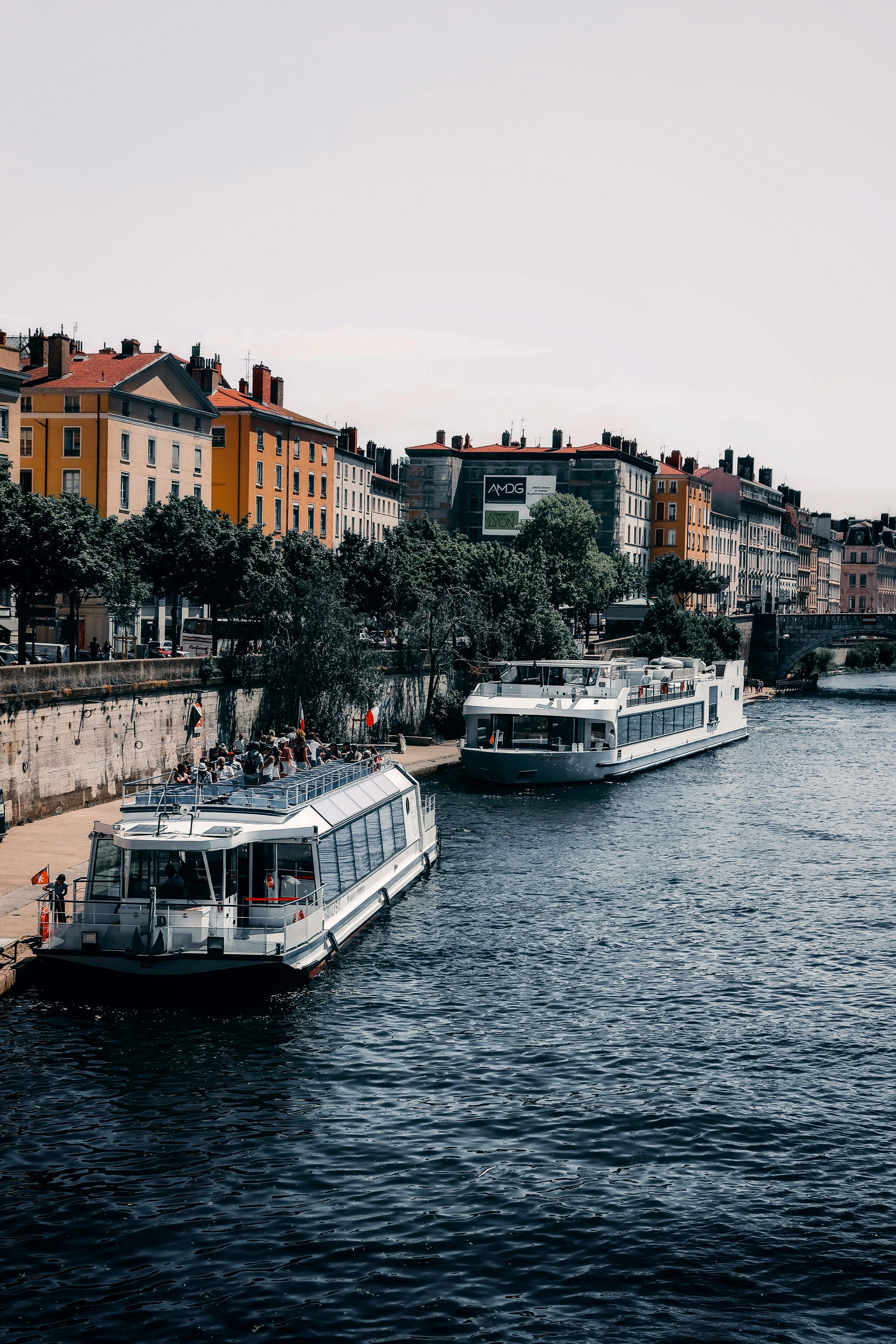 Ferry Boats Docked on the Riverbanks · Free Stock Photo