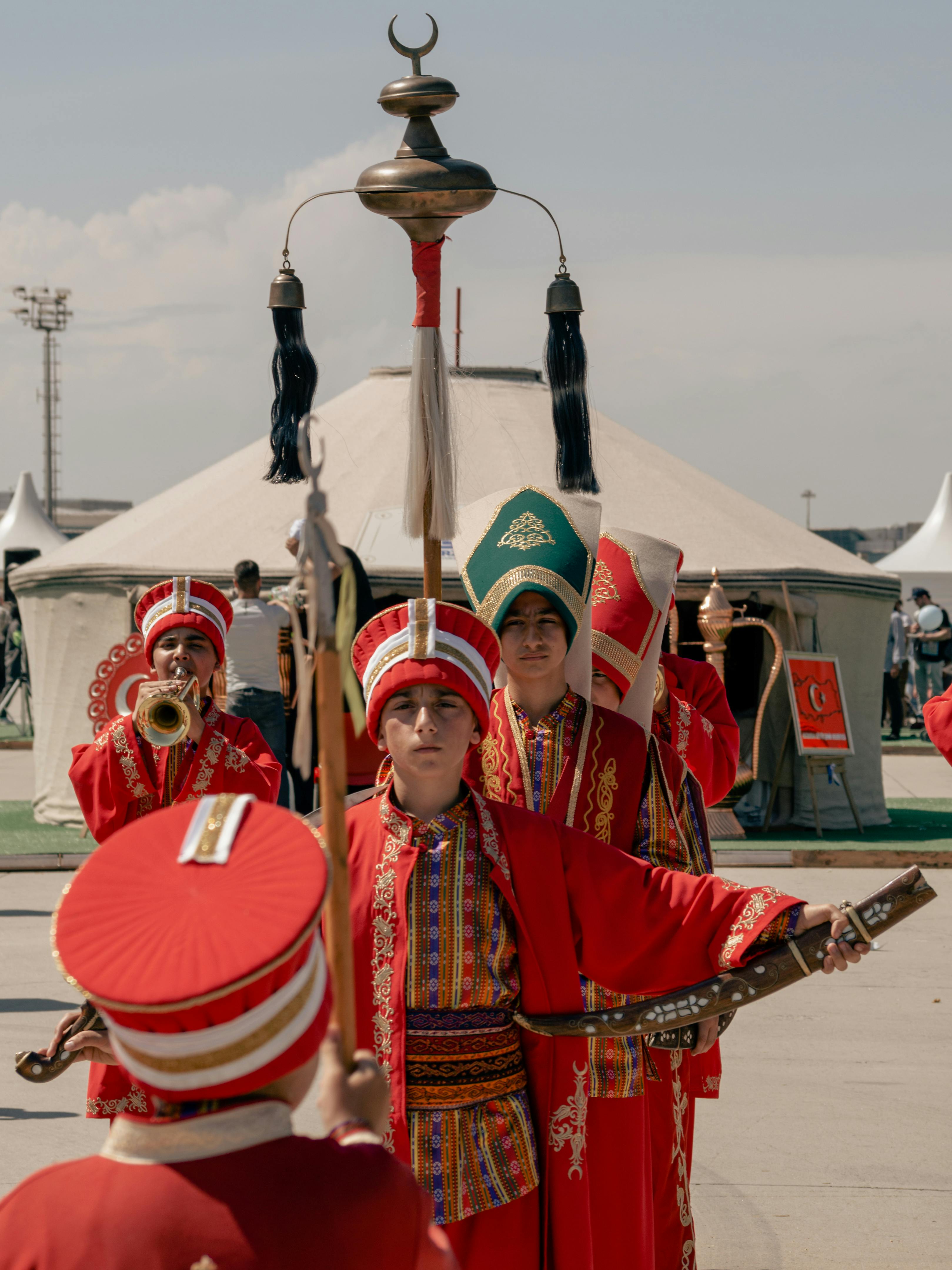 Group of Young Men Wearing Traditional Ottoman Clothing at a Parade ...