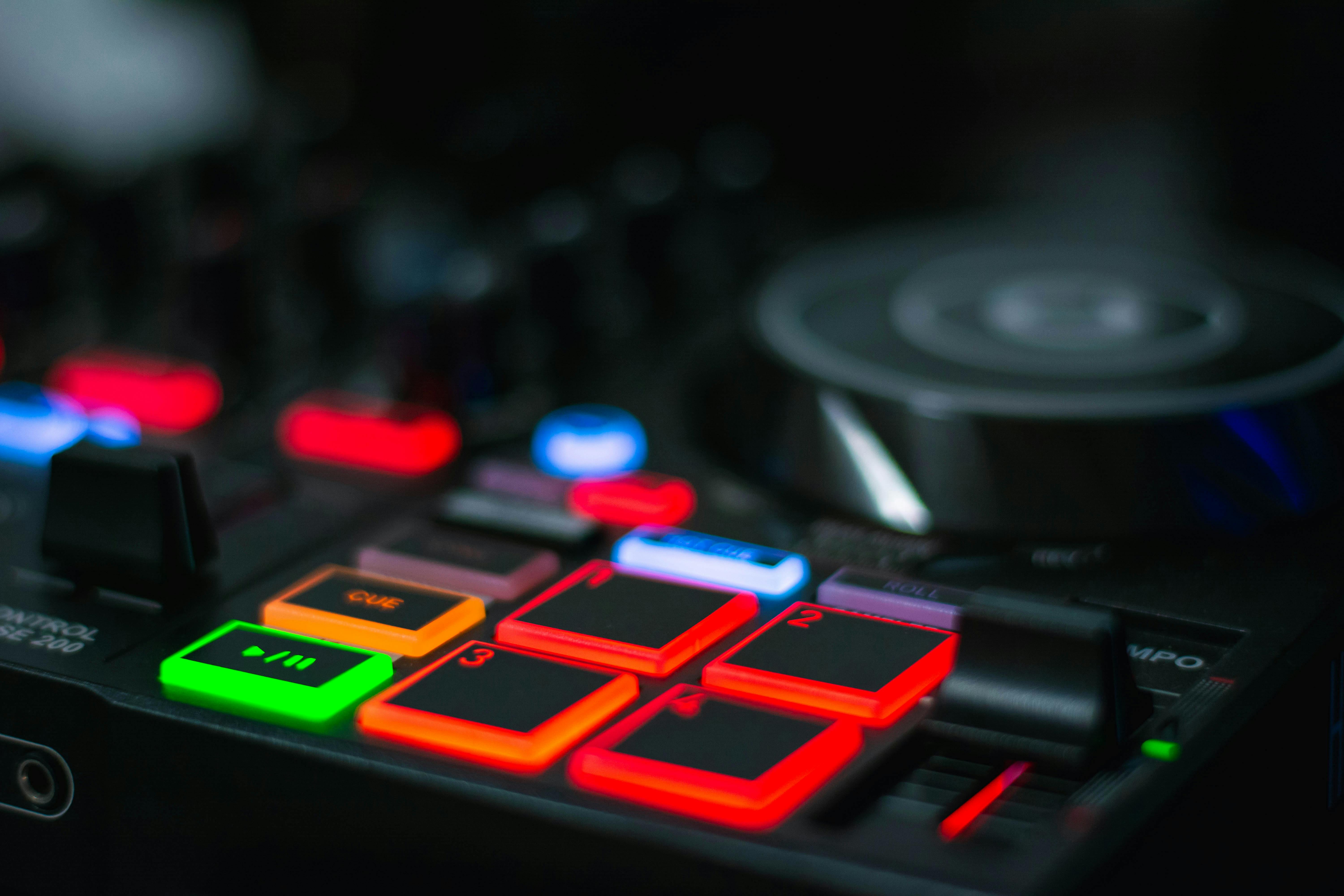 Close-Up Shot of a Colorful DJ Mixer Buttons · Free Stock Photo