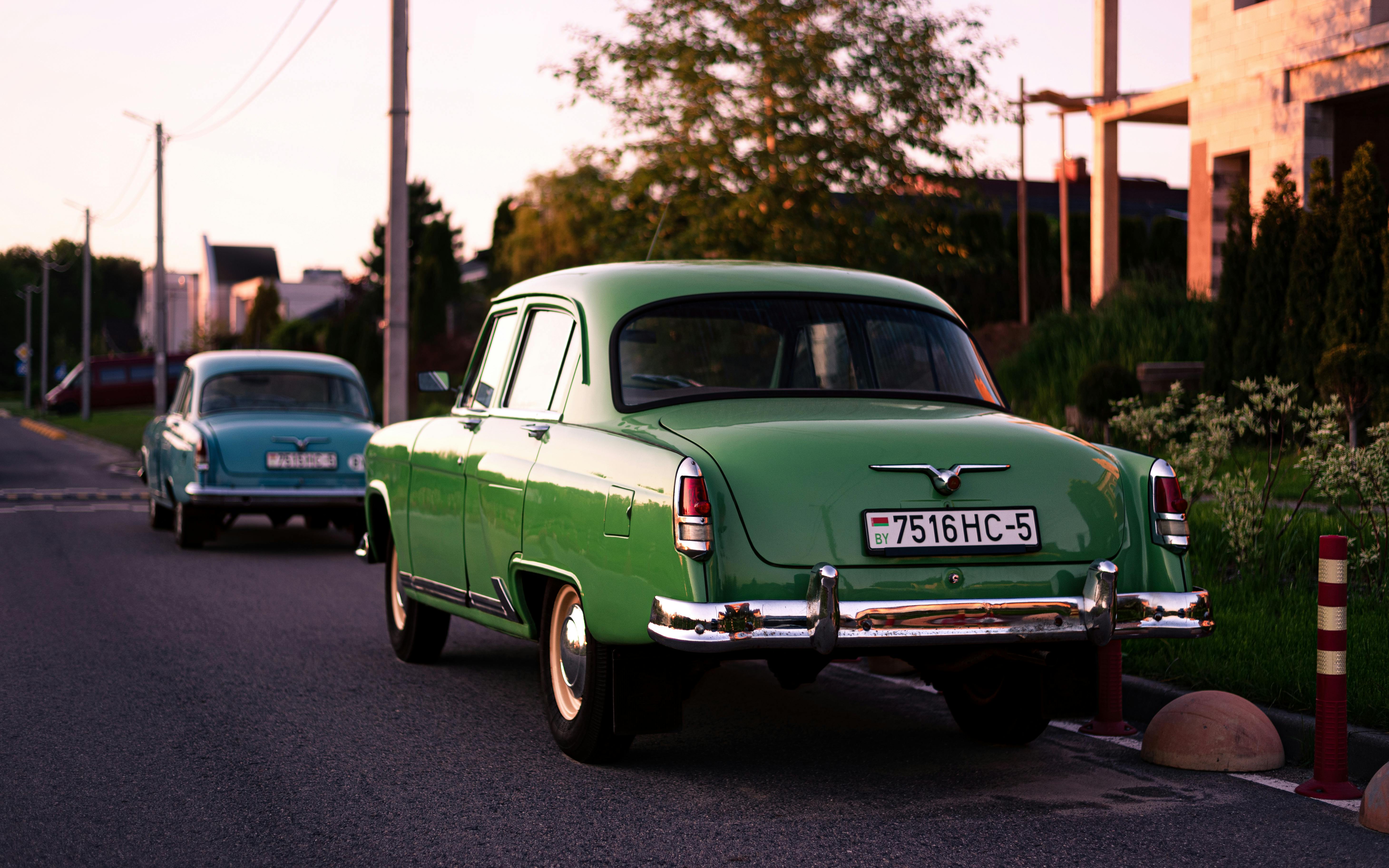 Gaz M21 Volga Cars Parked at the side of the Road · Free Stock Photo