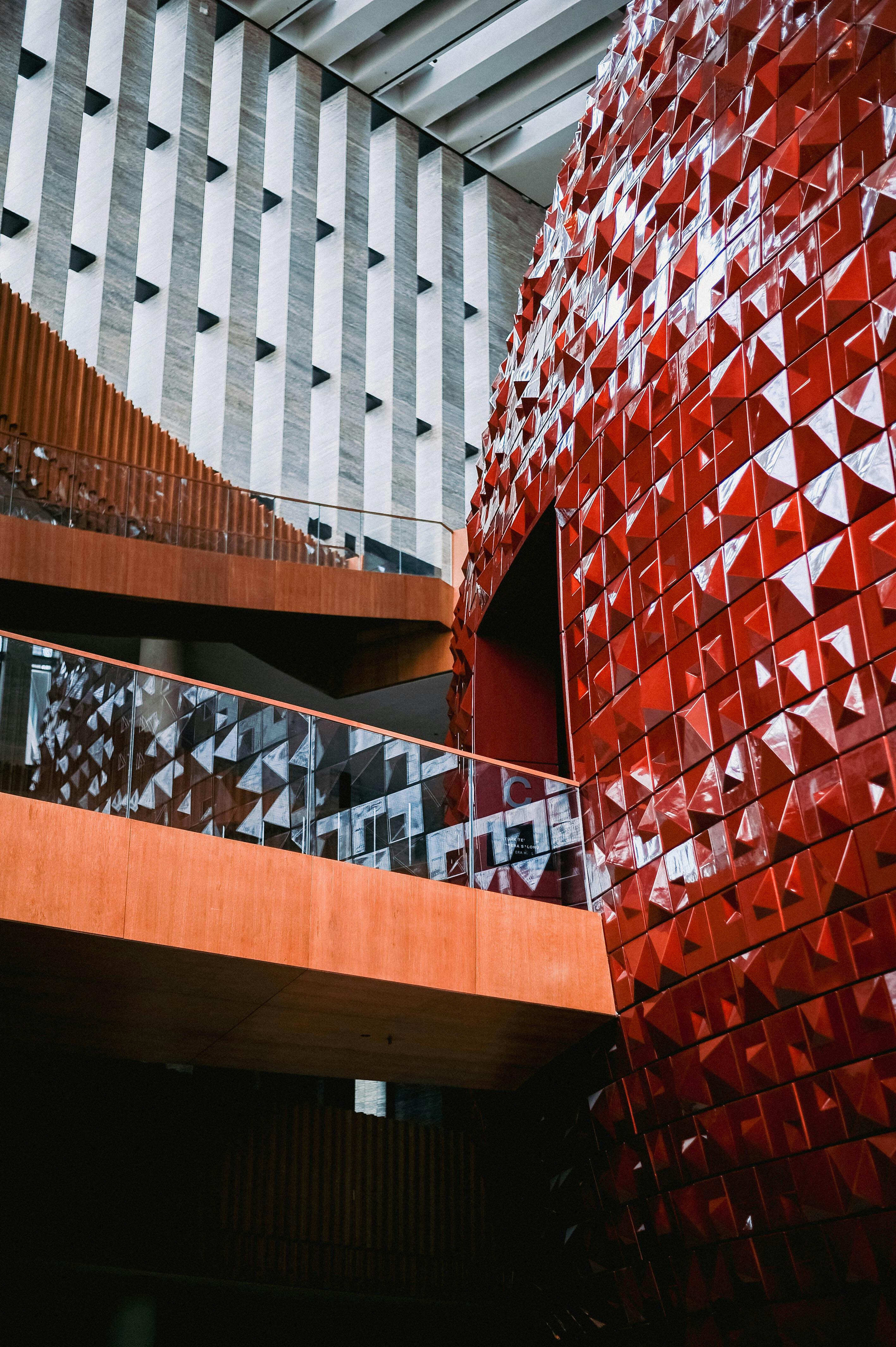 A Footbridge on a Red Tiled Building Entrance · Free Stock Photo