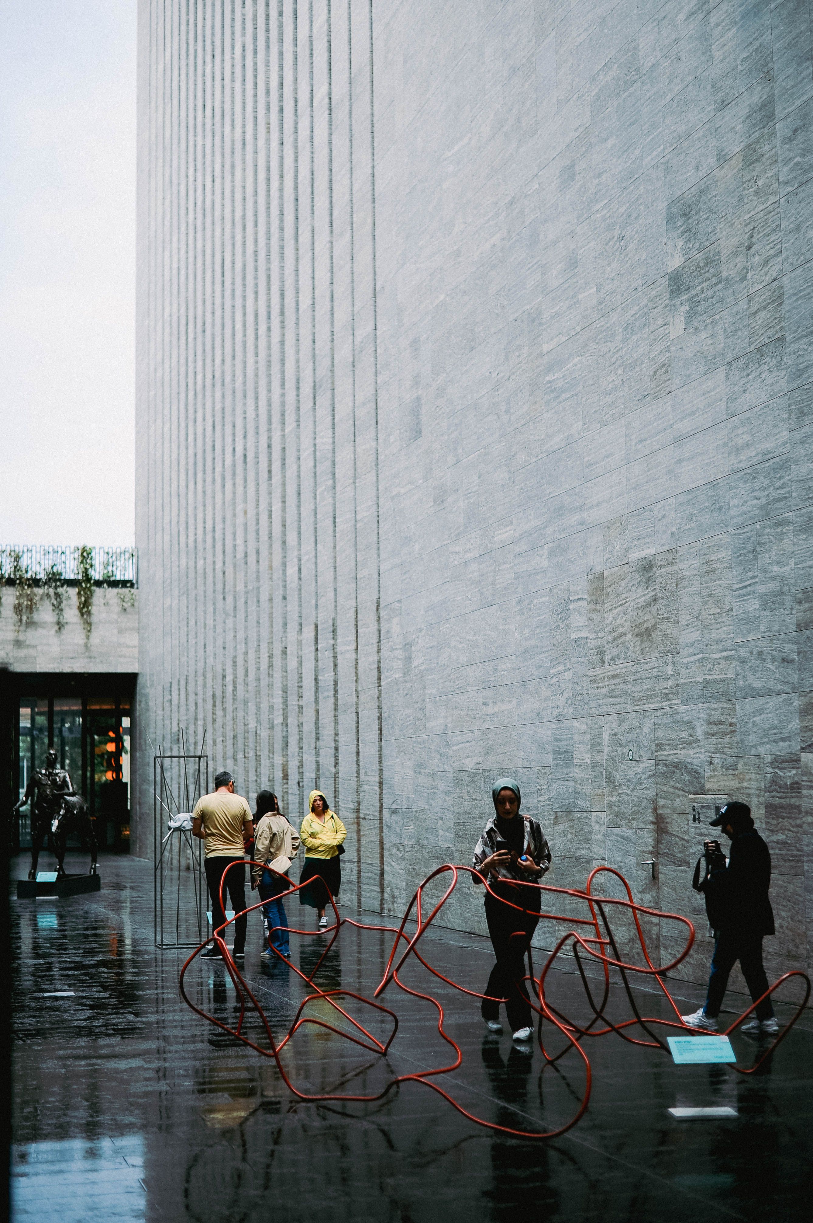People Walking Outside a Modern Art Museum · Free Stock Photo