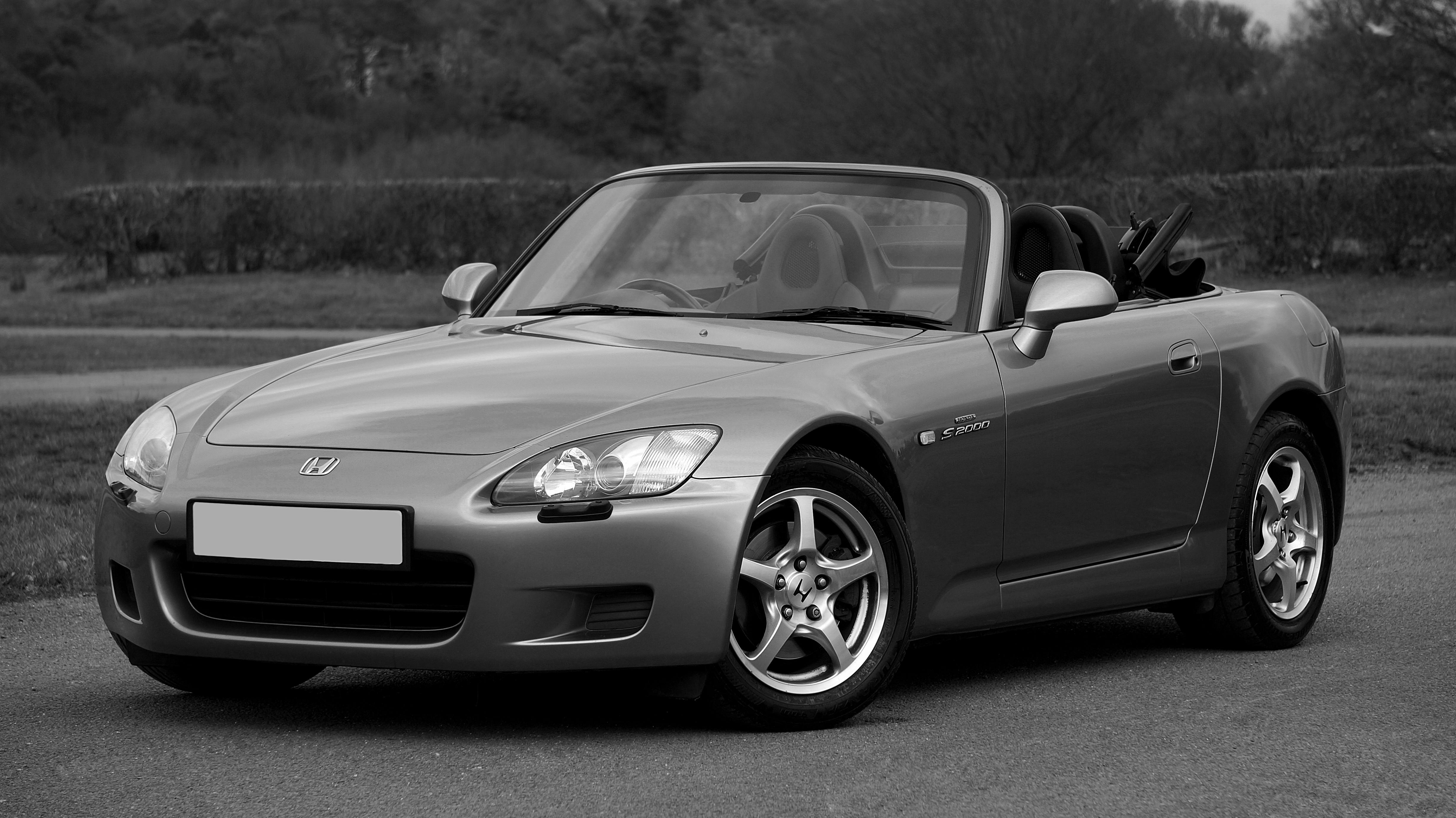 Black Convertible Car on a Parking Lot · Free Stock Photo