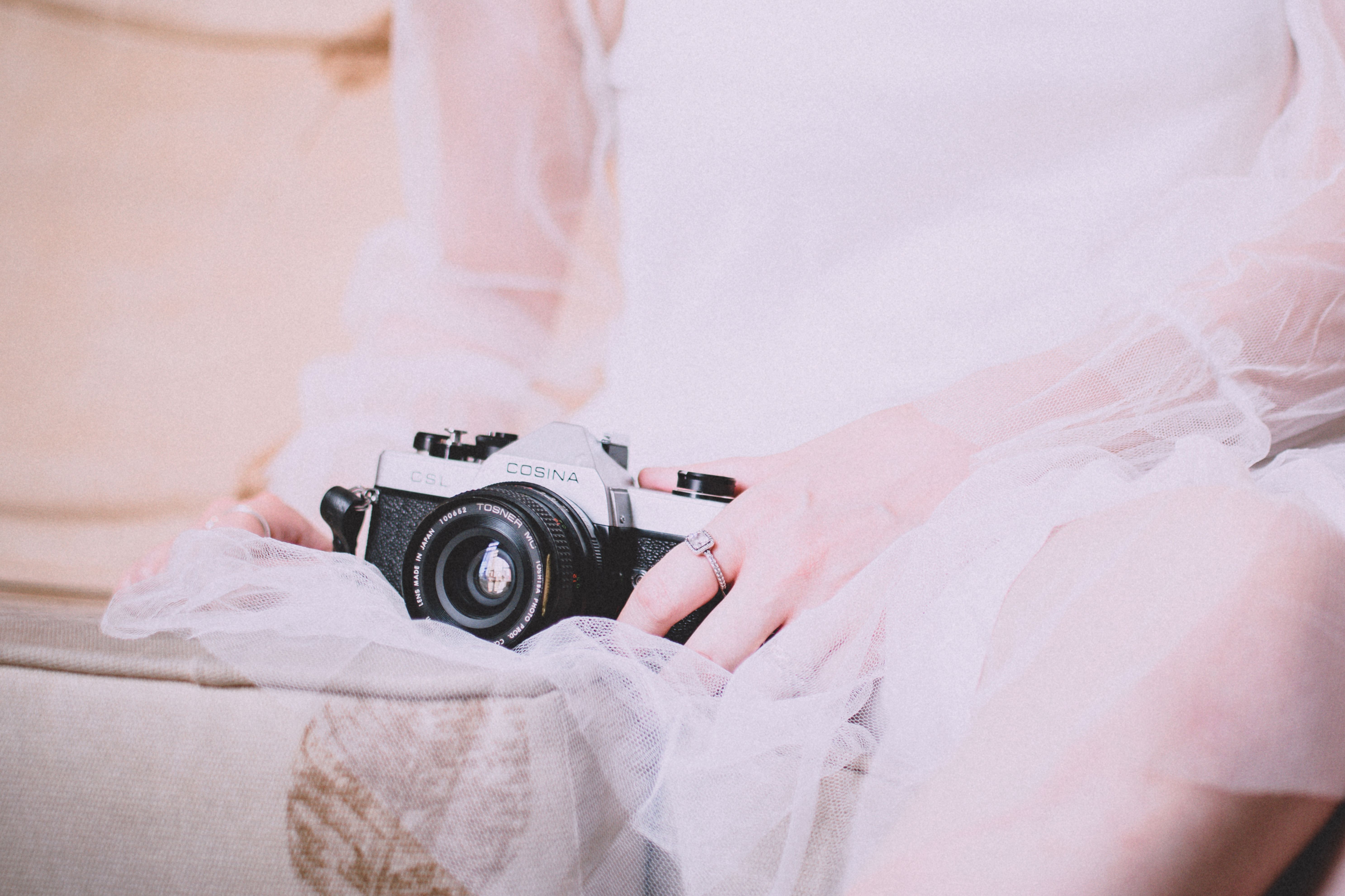 Person Holding Black Mirrorless Camera · Free Stock Photo