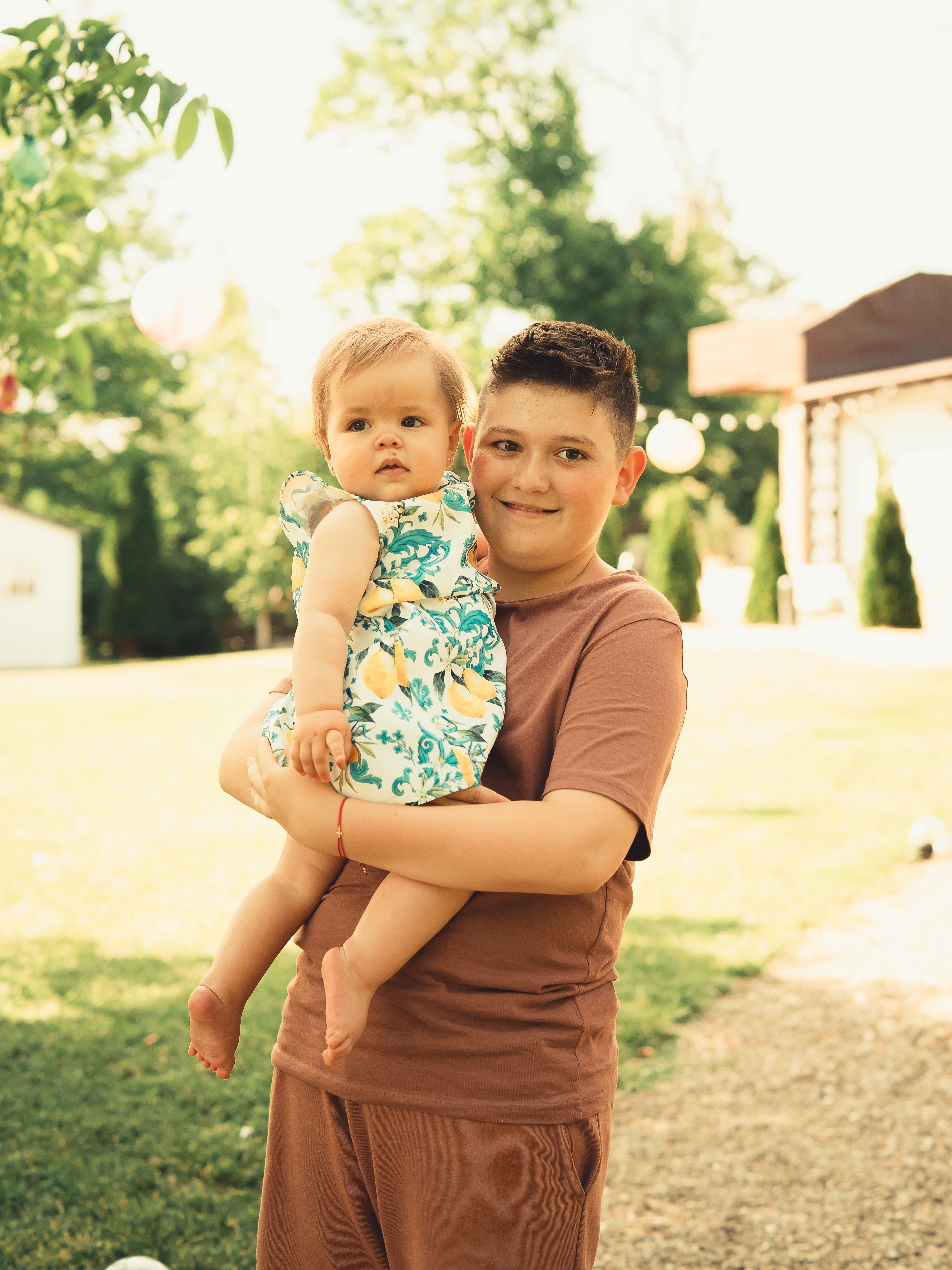 A Boy Carrying a Pickaxe · Free Stock Photo
