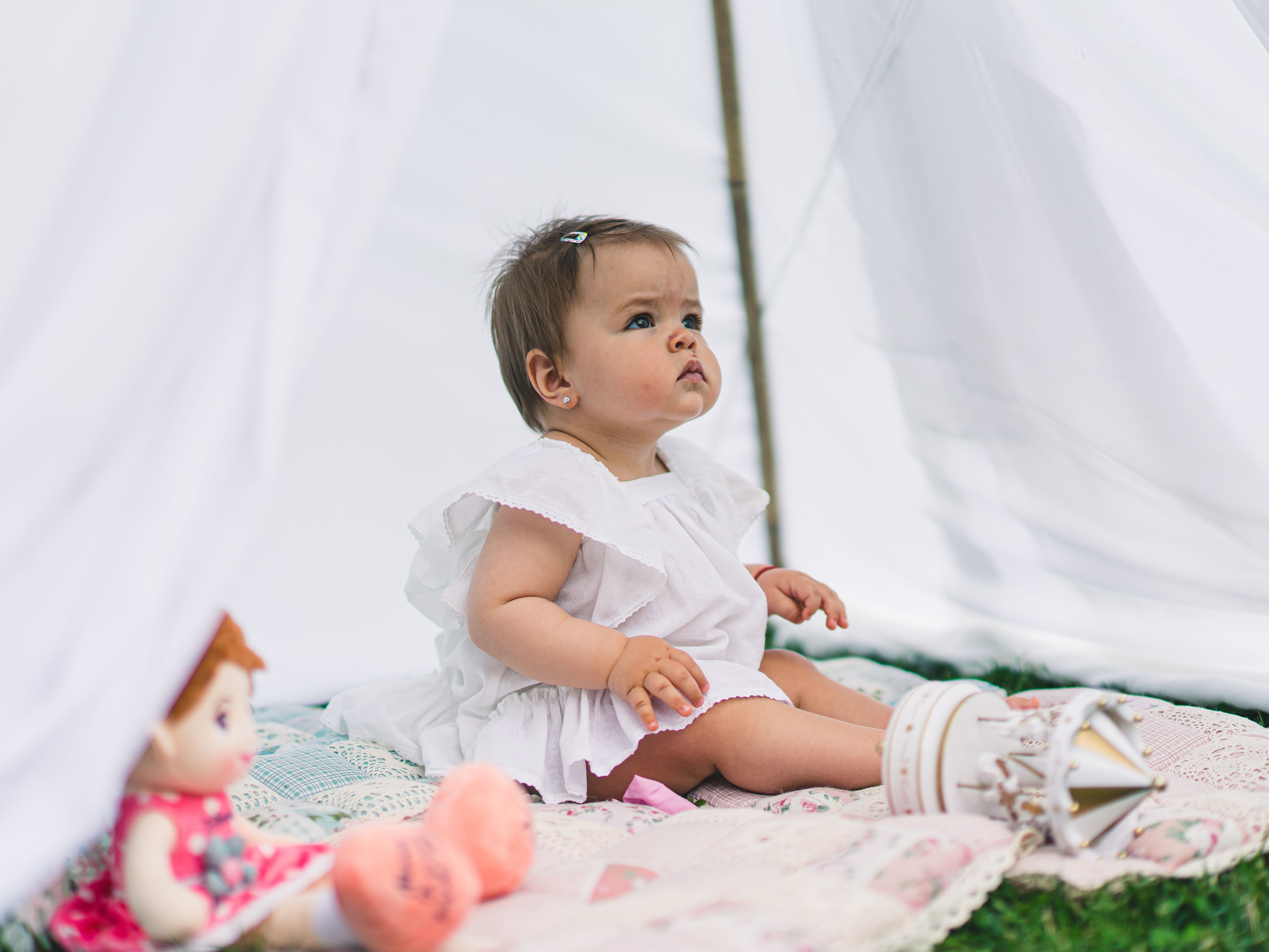 Girl Holding A Doll · Free Stock Photo
