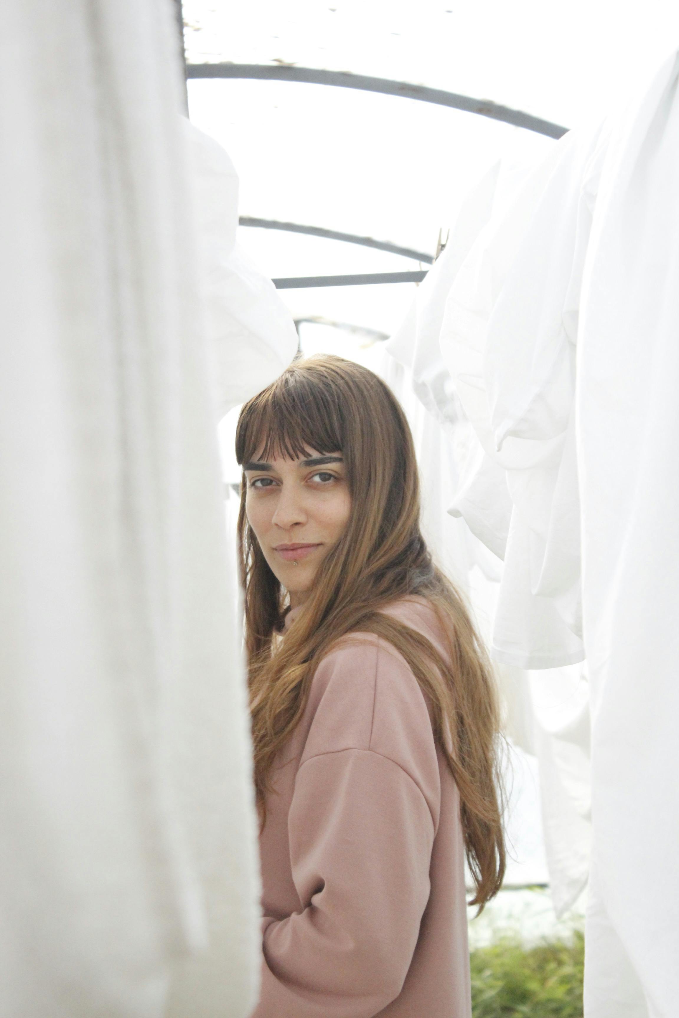 Figure of Human Body on White Sheet · Free Stock Photo