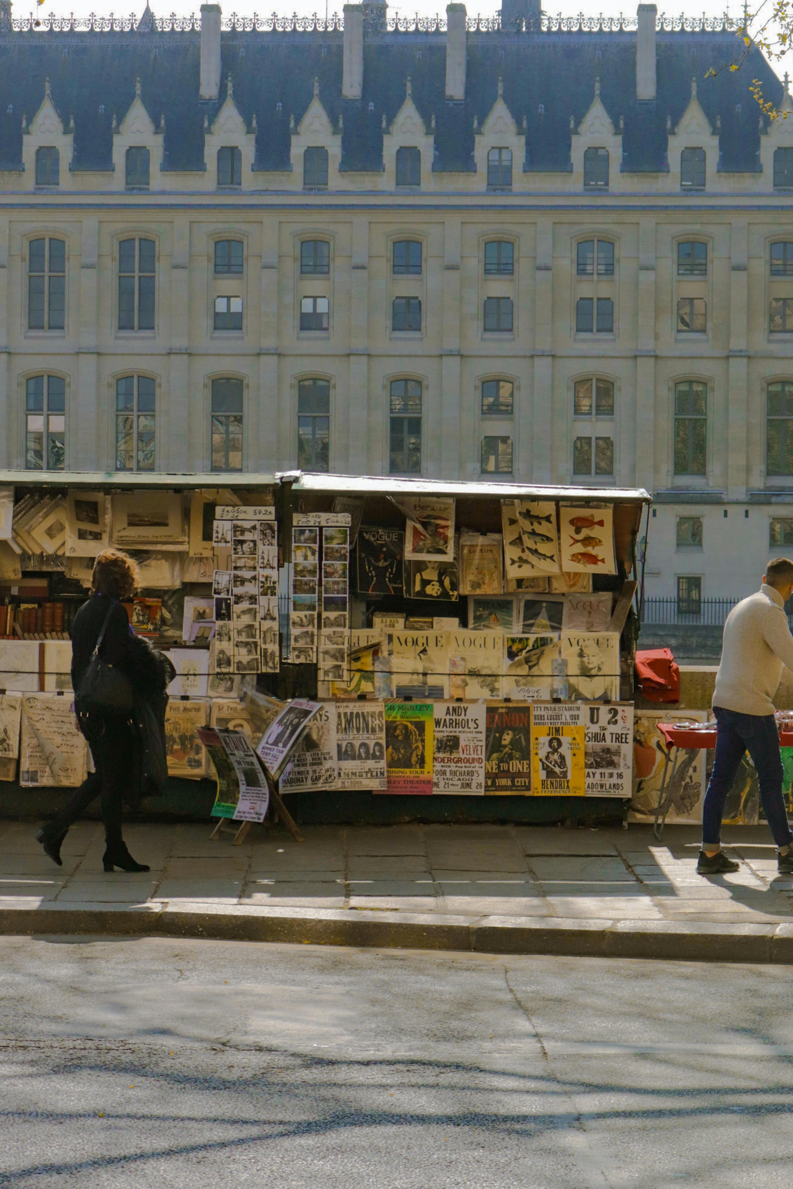 People Walking on the Sidewalk Near the Stalls · Free Stock Photo