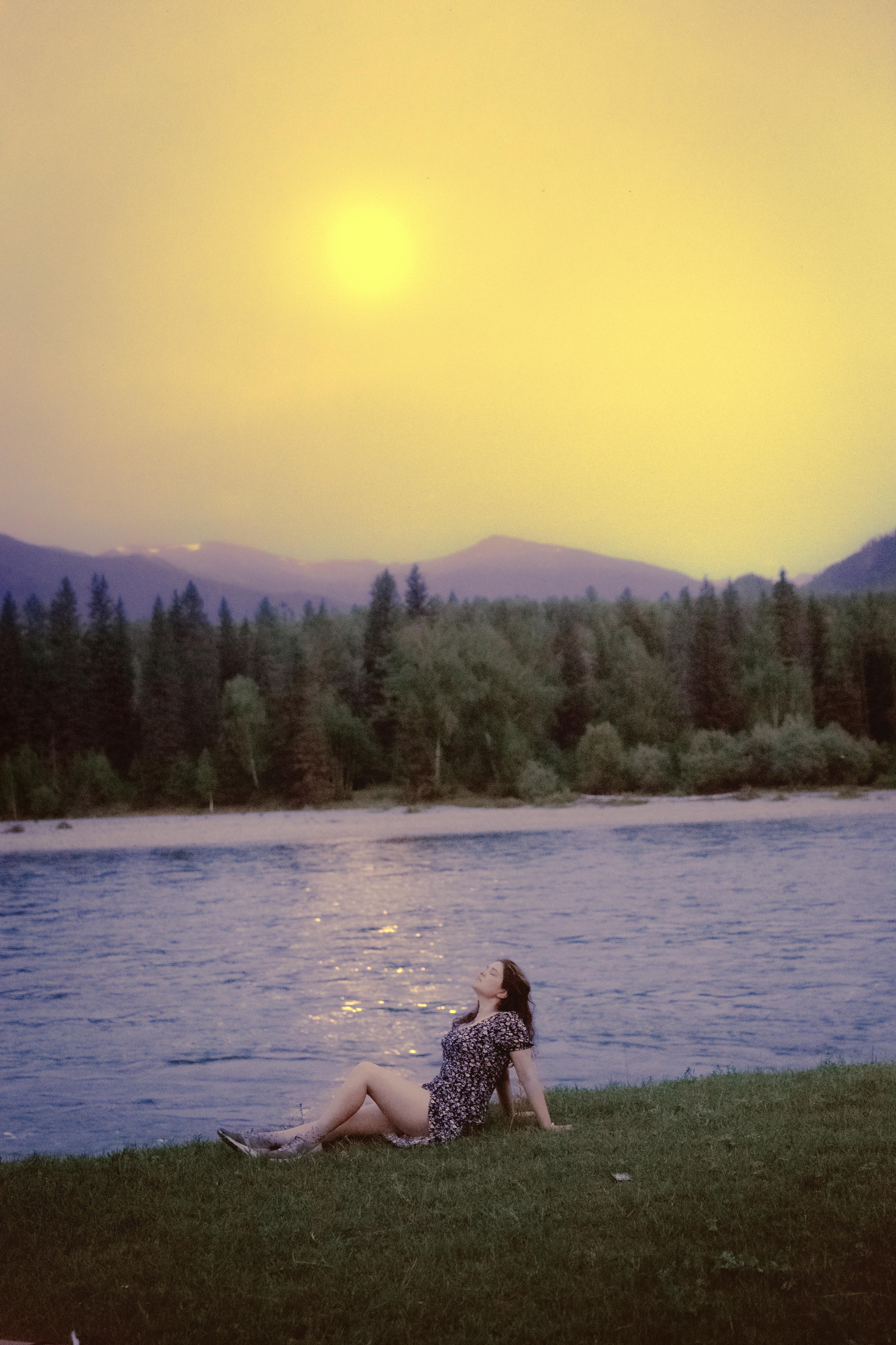 Woman Posing near River · Free Stock Photo