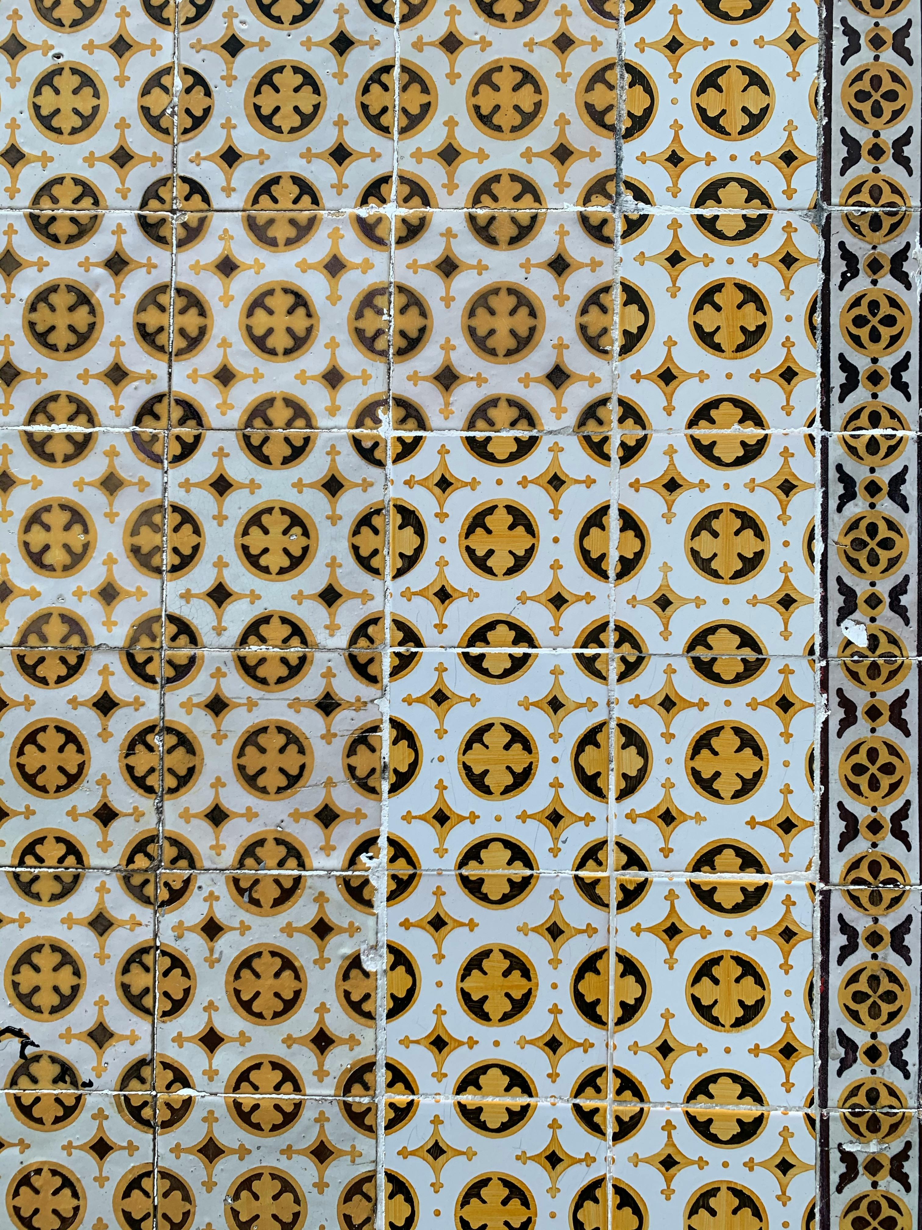 Close-up of Ornate Tiles on Wall · Free Stock Photo