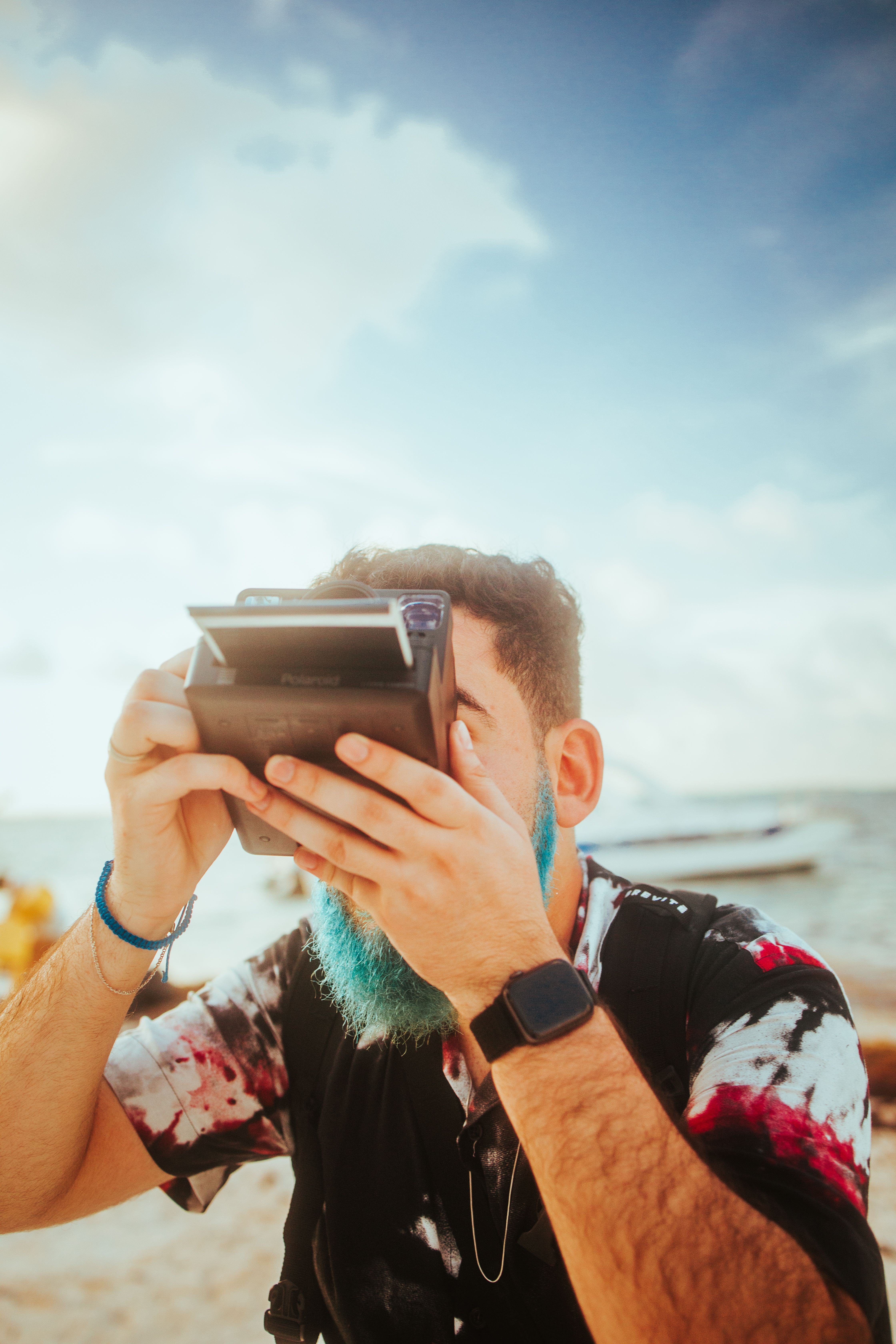 A Person using Polaroid Camera · Free Stock Photo