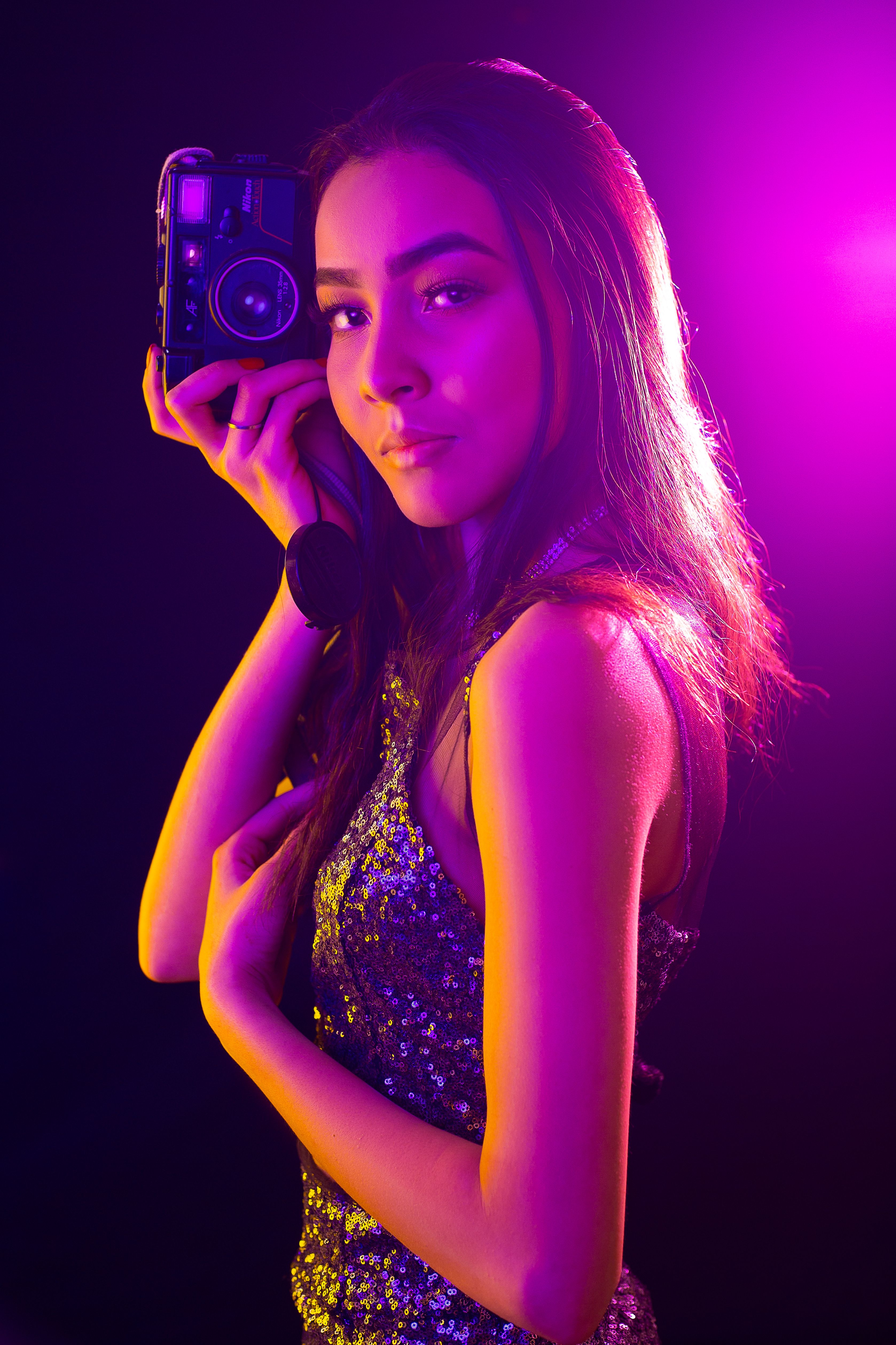 Woman Holding a Camera · Free Stock Photo