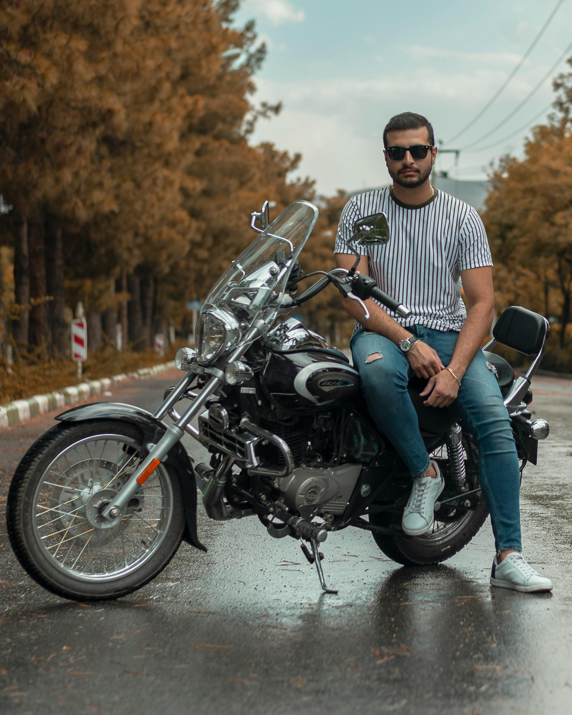 Man Posing on Motorcycle · Free Stock Photo
