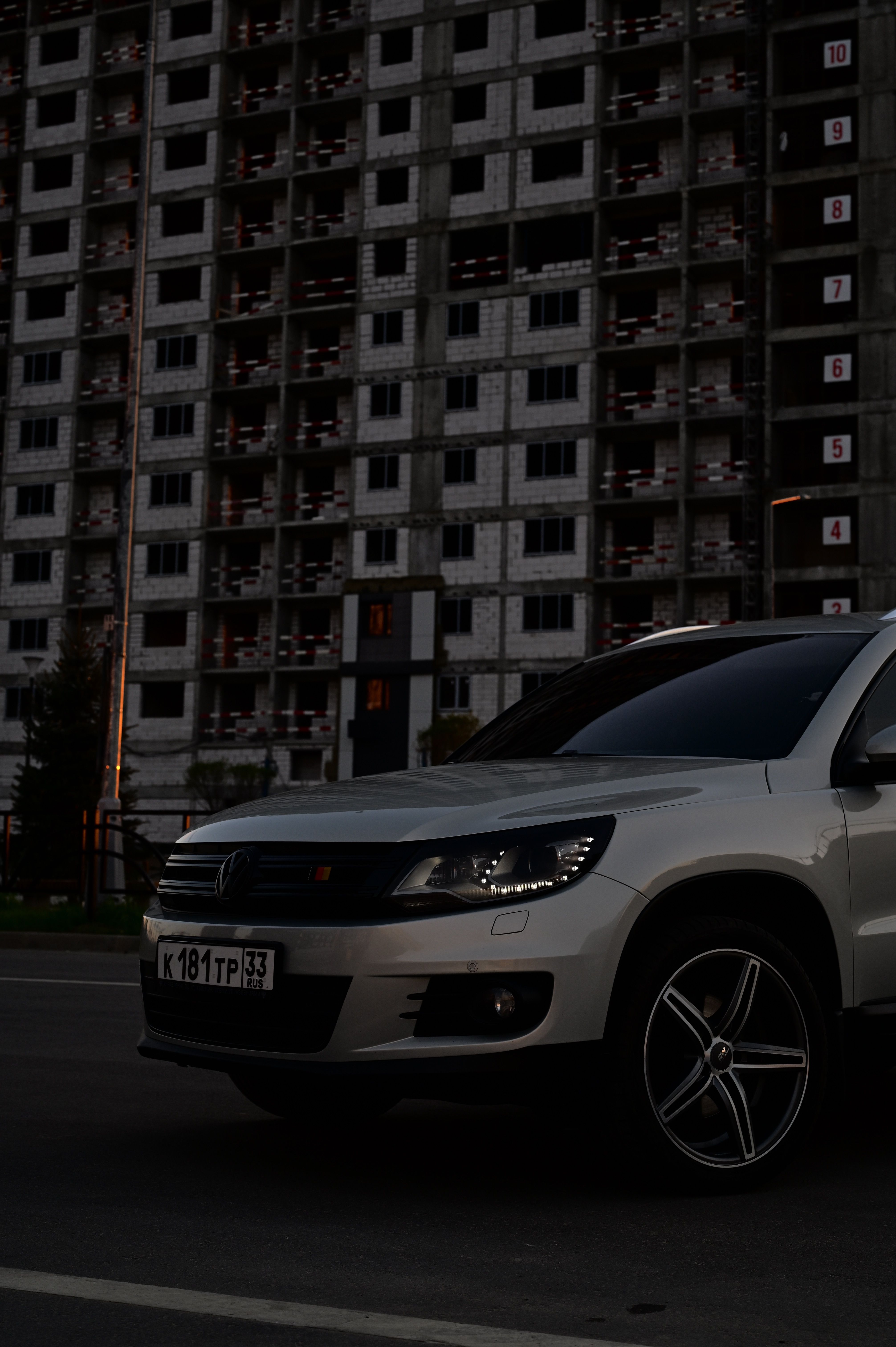 Silver Car Near a Building · Free Stock Photo
