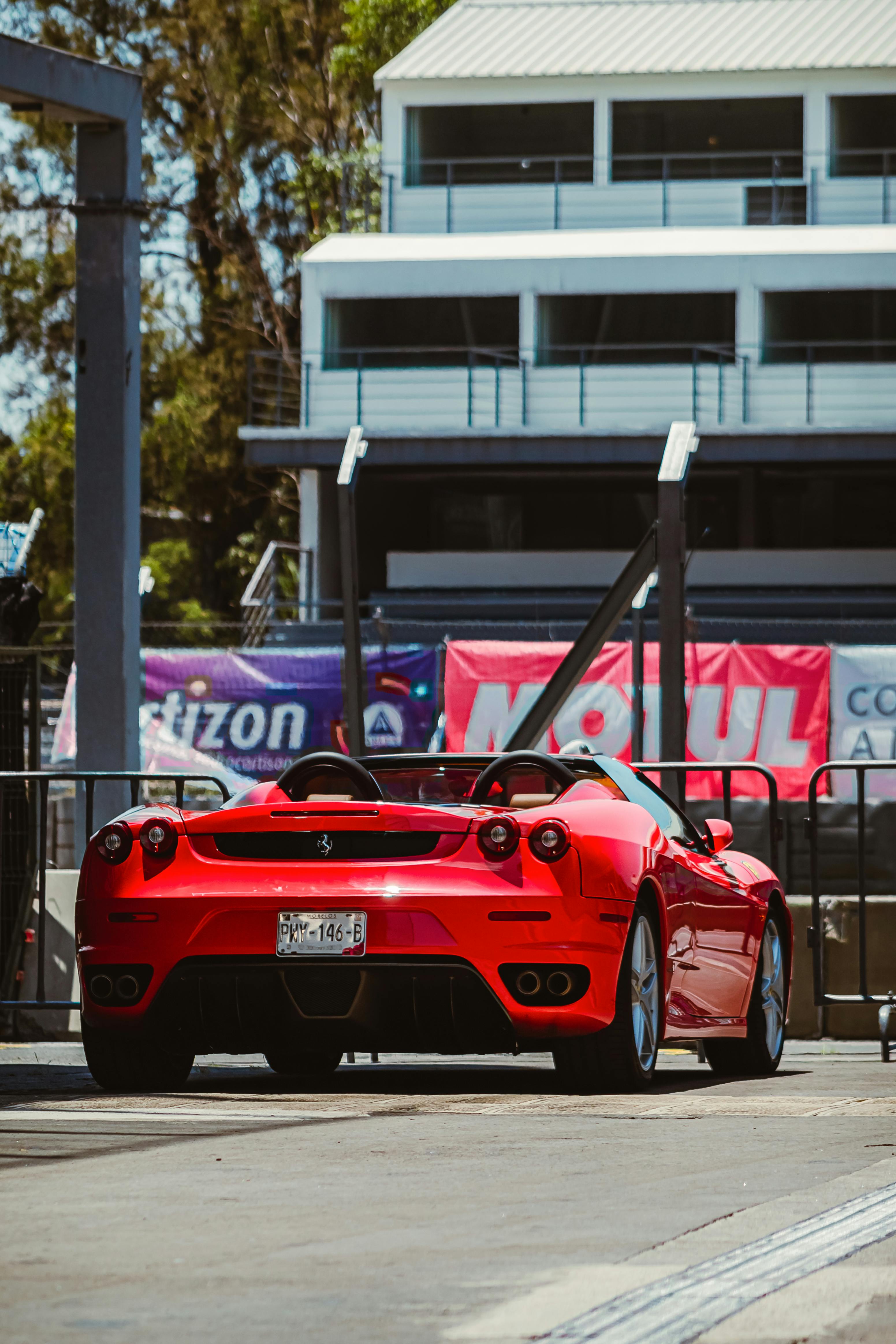 Back View of a Red Ferrari SF90 Stradale · Free Stock Photo
