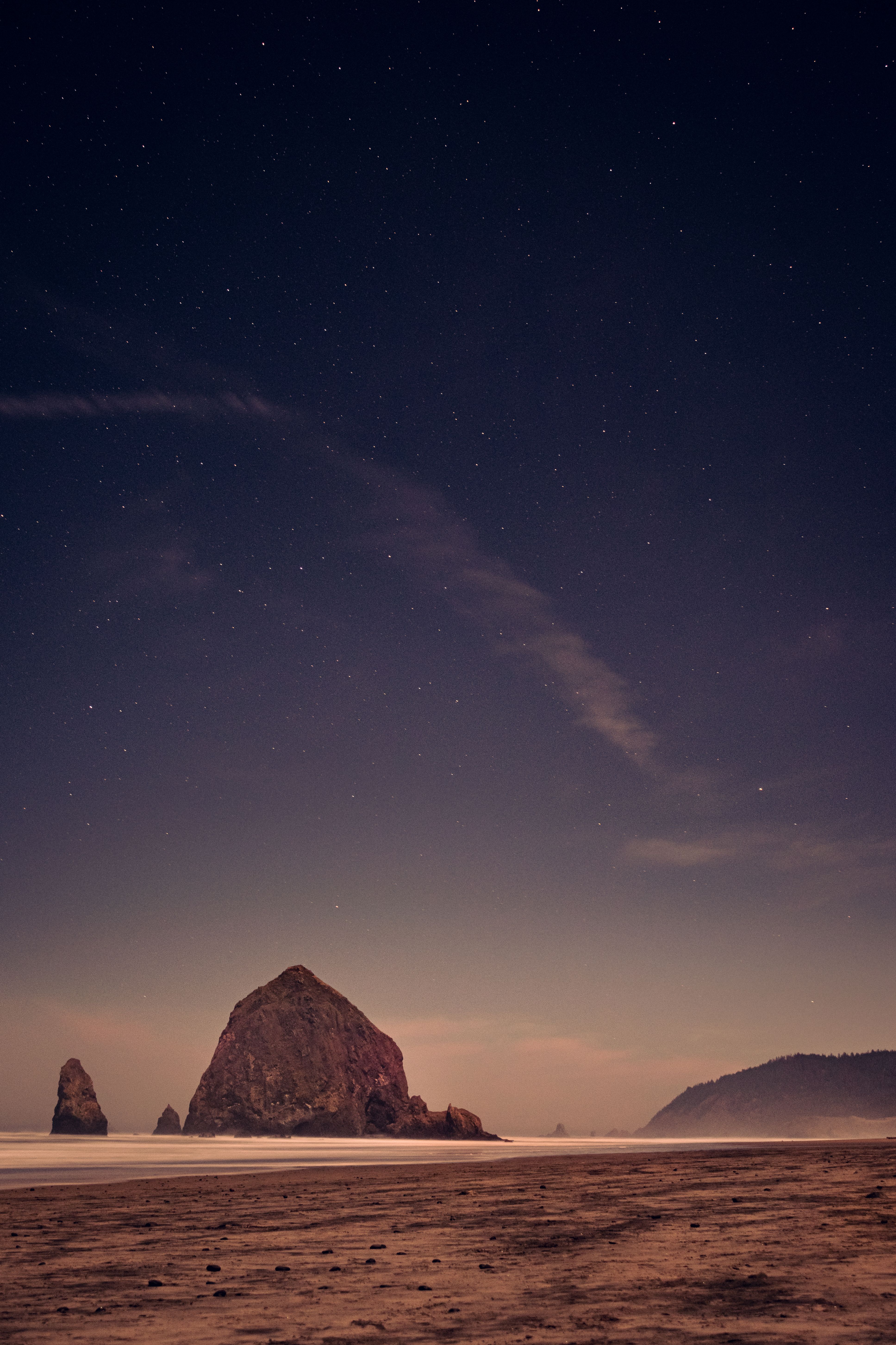 Natural Rock Formation Under a Starry Blue Sky · Free Stock Photo