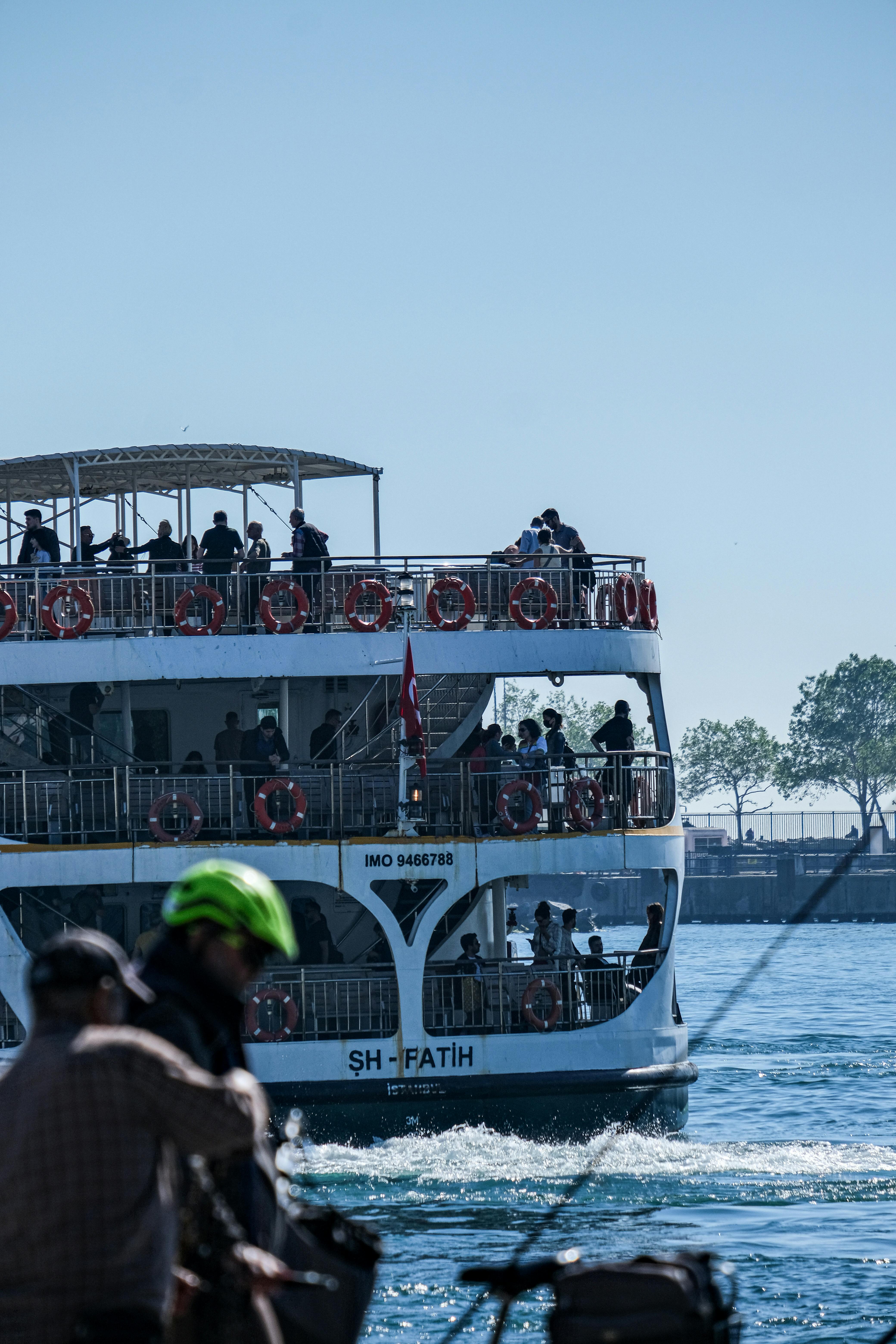 Ferry with People On Board in River · Free Stock Photo