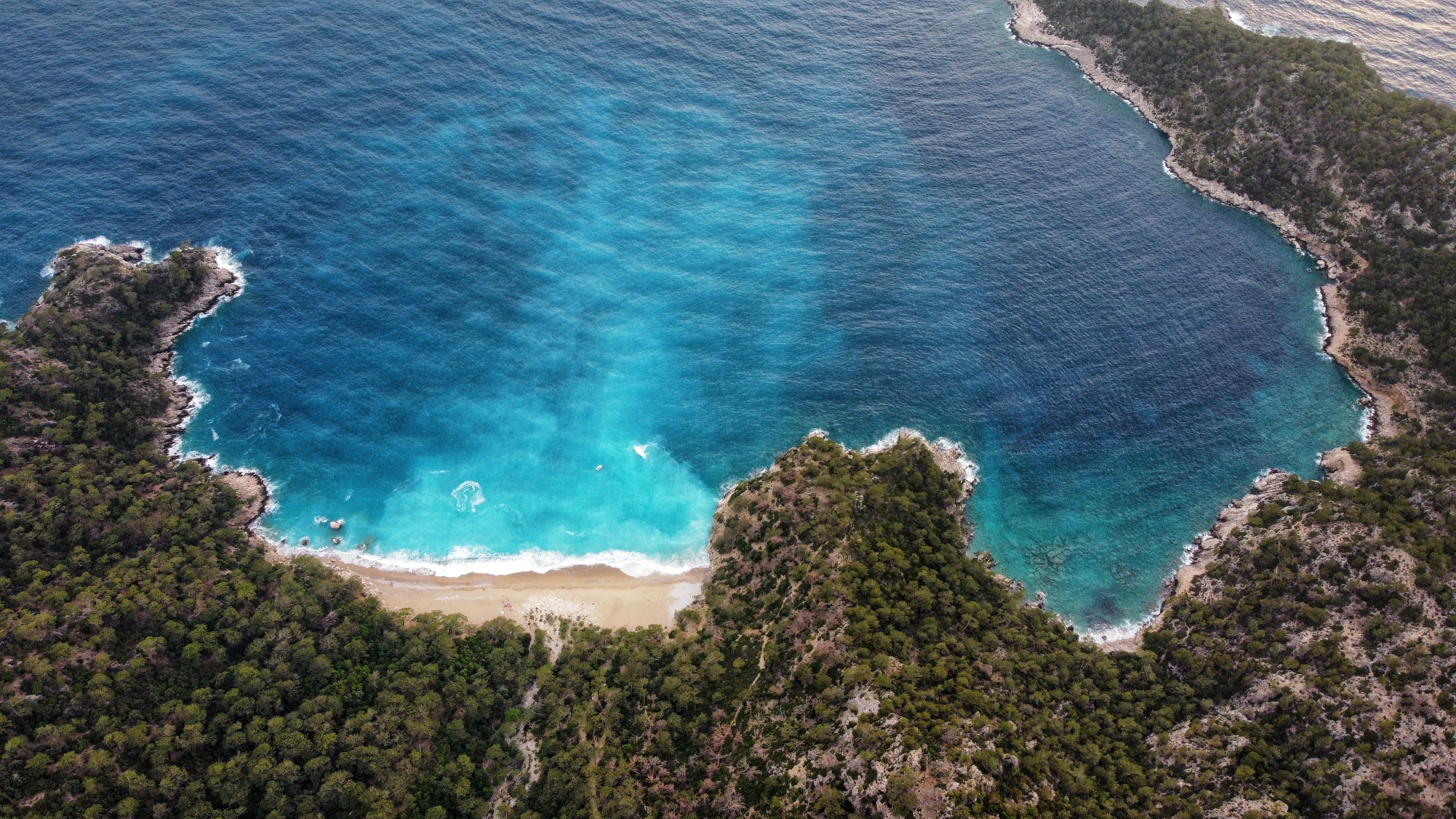 Aerial Photography of Blue Lake Near Green Mountains · Free Stock Photo
