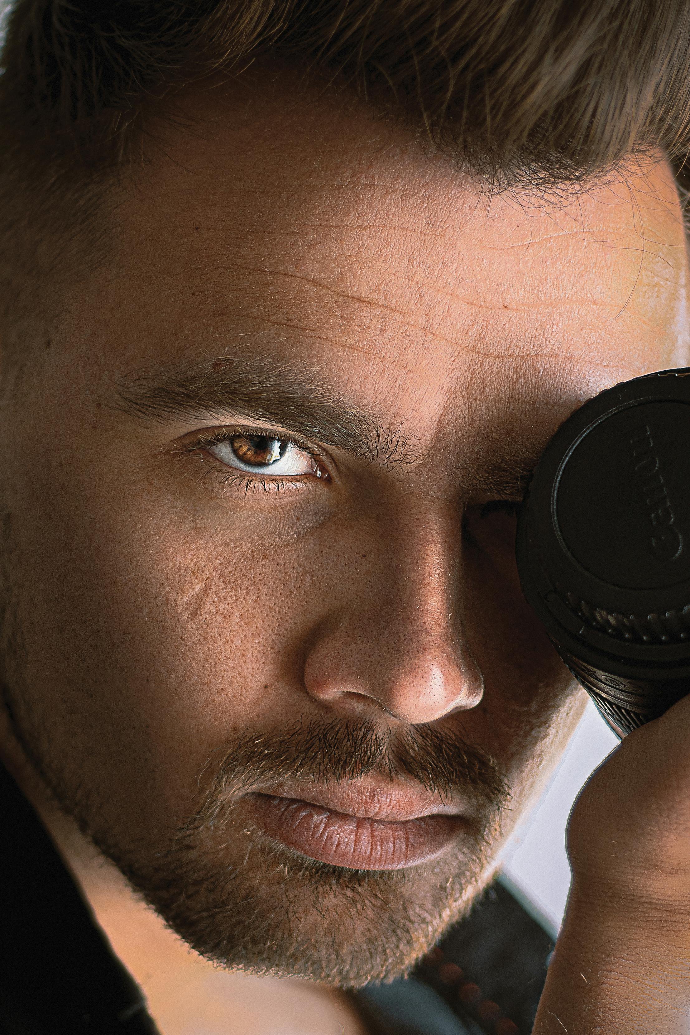 Man Holding Fingers on Eyes · Free Stock Photo