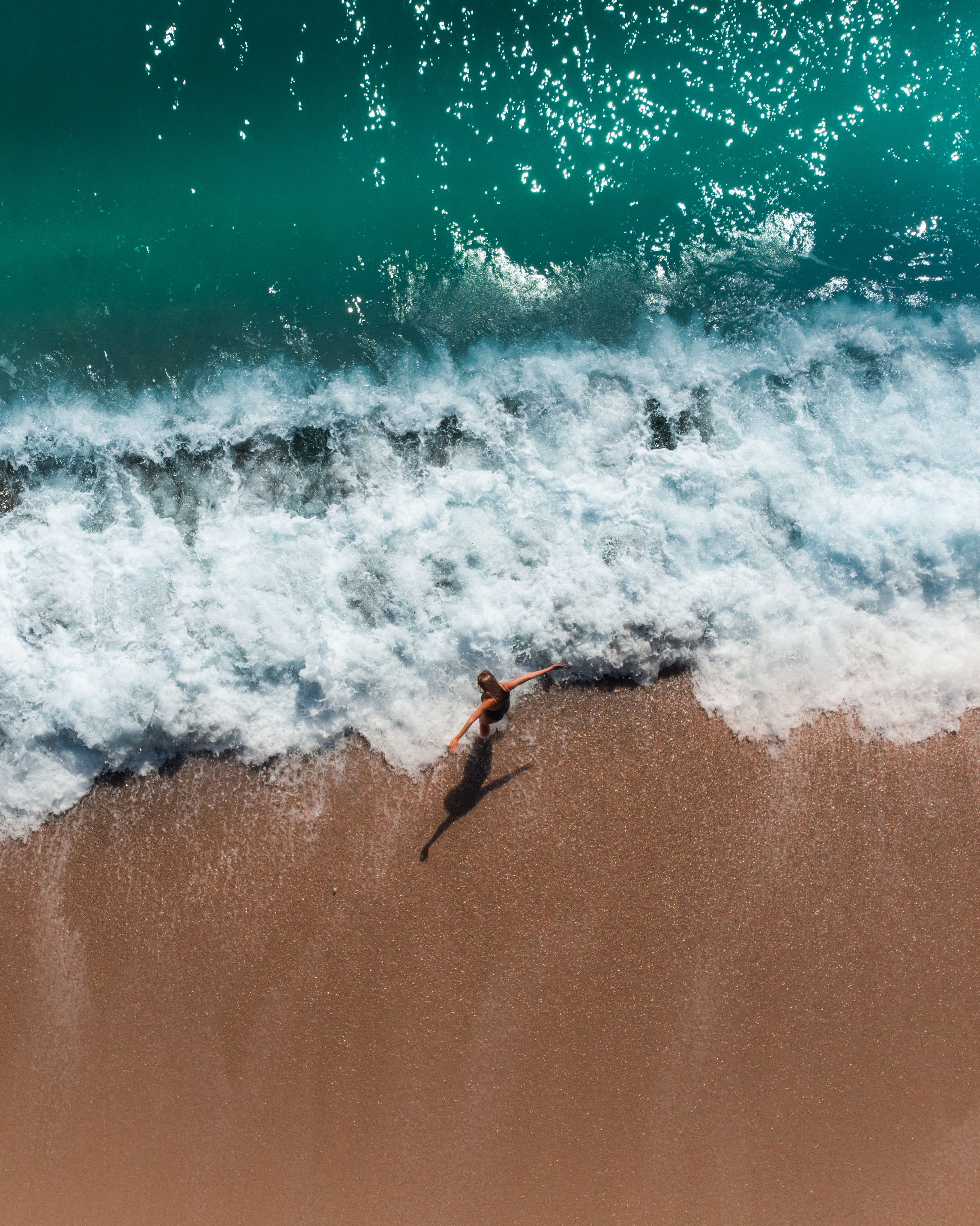Aerial Shot of Person on the Seashore · Free Stock Photo