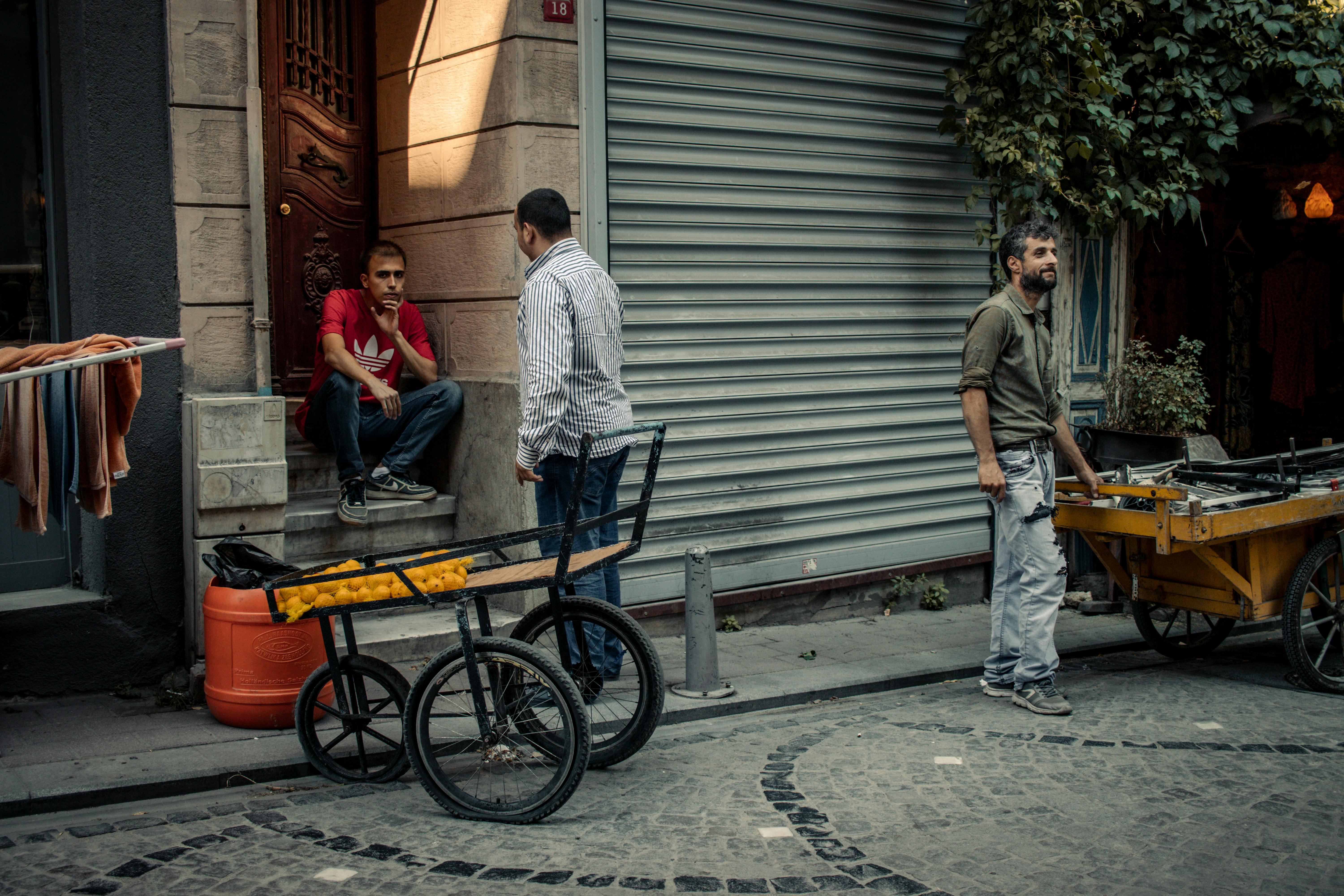 Men Having Conversation on the Street · Free Stock Photo