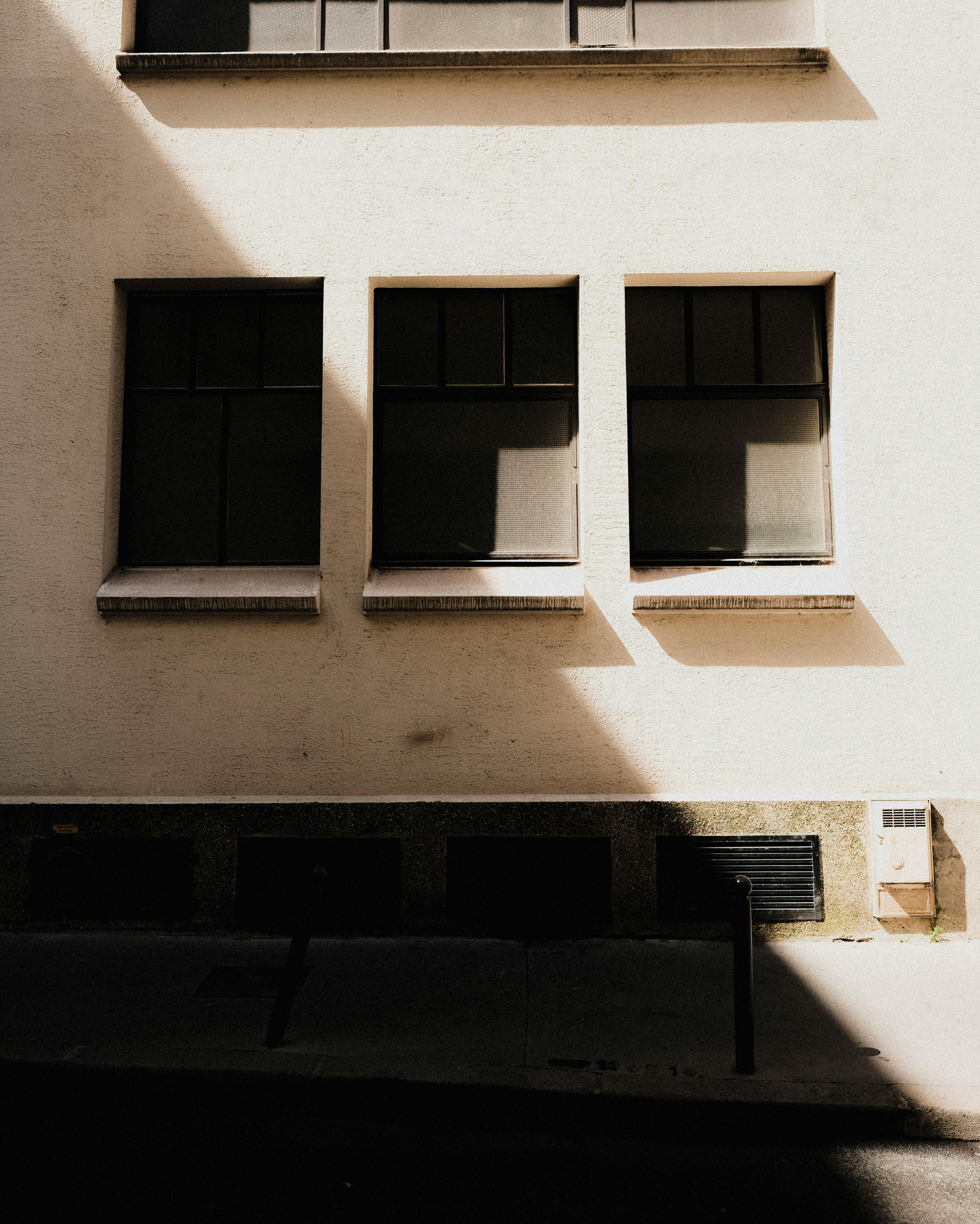 Sunlight and Shadow on Building · Free Stock Photo