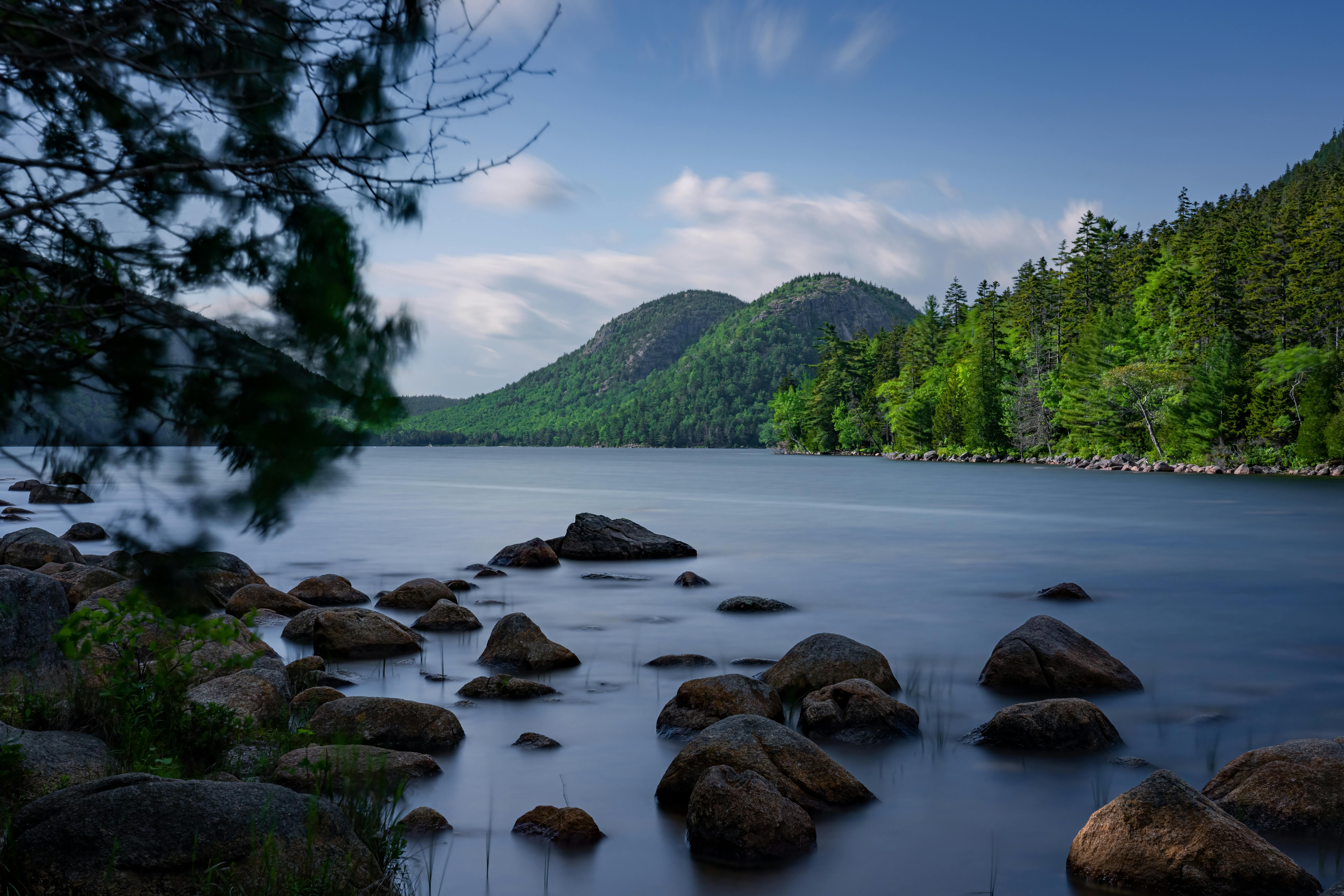Beautiful Body of Water with Rocks · Free Stock Photo