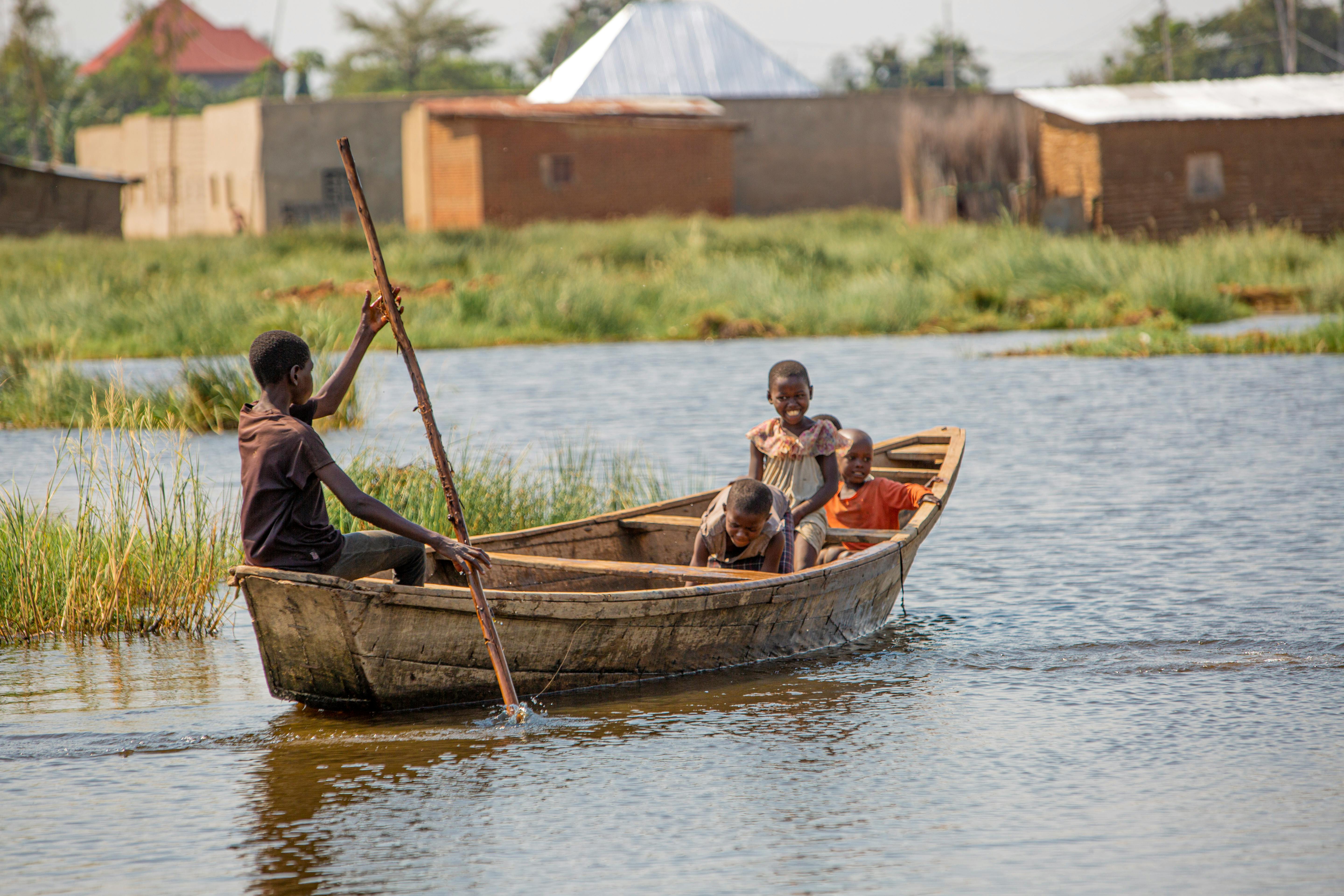 Kids Riding a Rowing Boat · Free Stock Photo