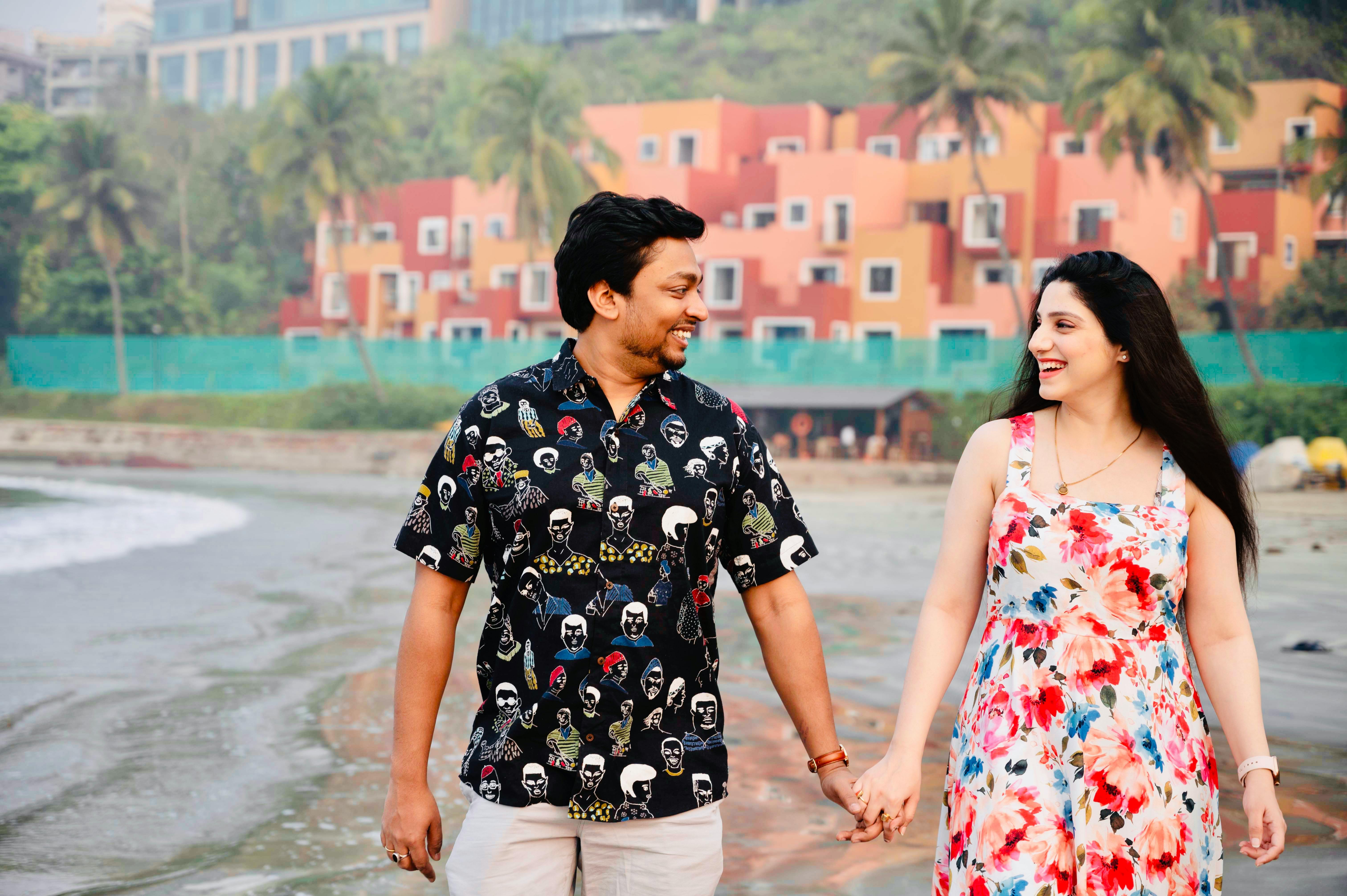 A Couple Holding Hands While Walking · Free Stock Photo