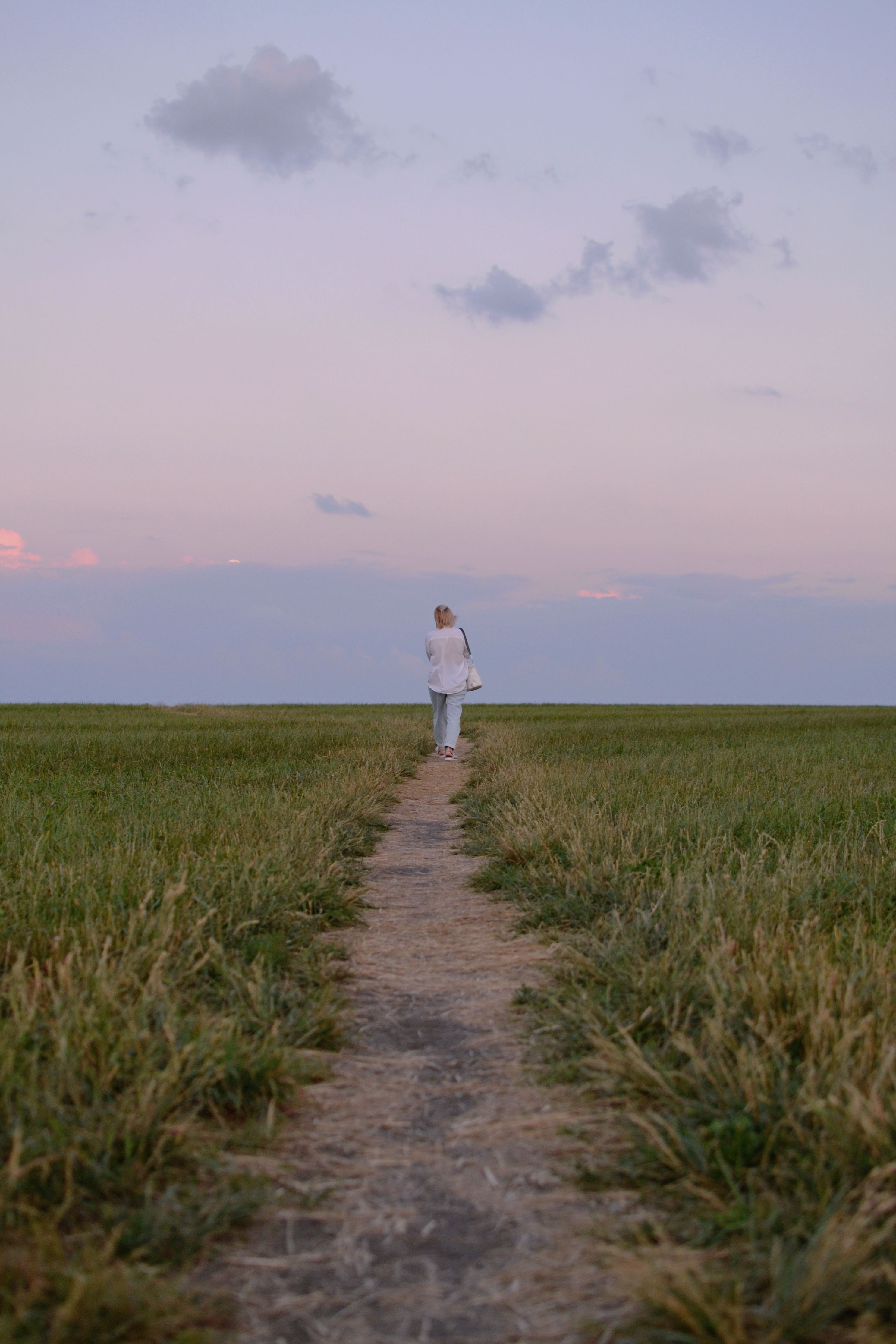 Woman in a White Dress Walking on a Pathway on a Countryside · Free ...