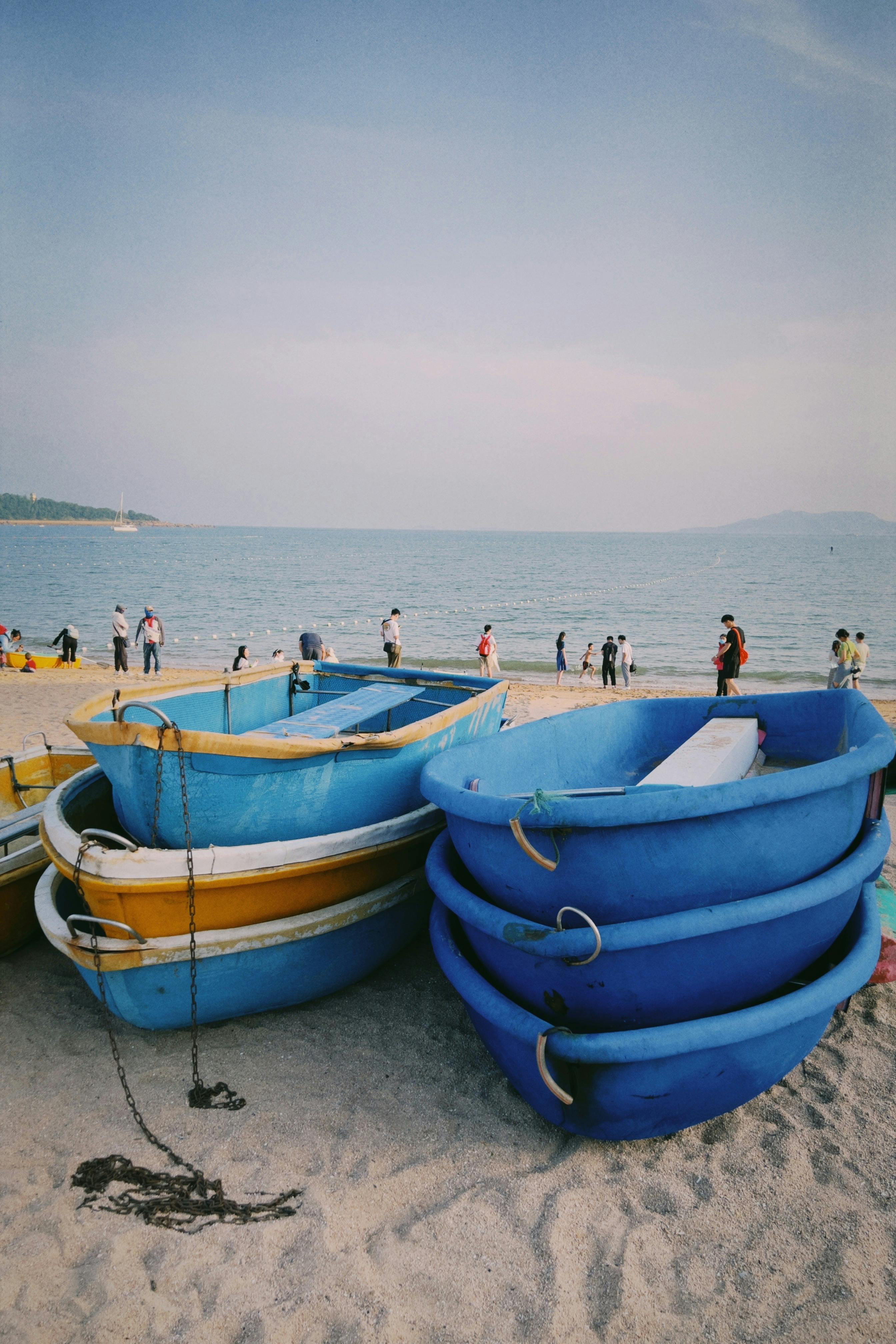 Stacks of Boats on a Beach · Free Stock Photo