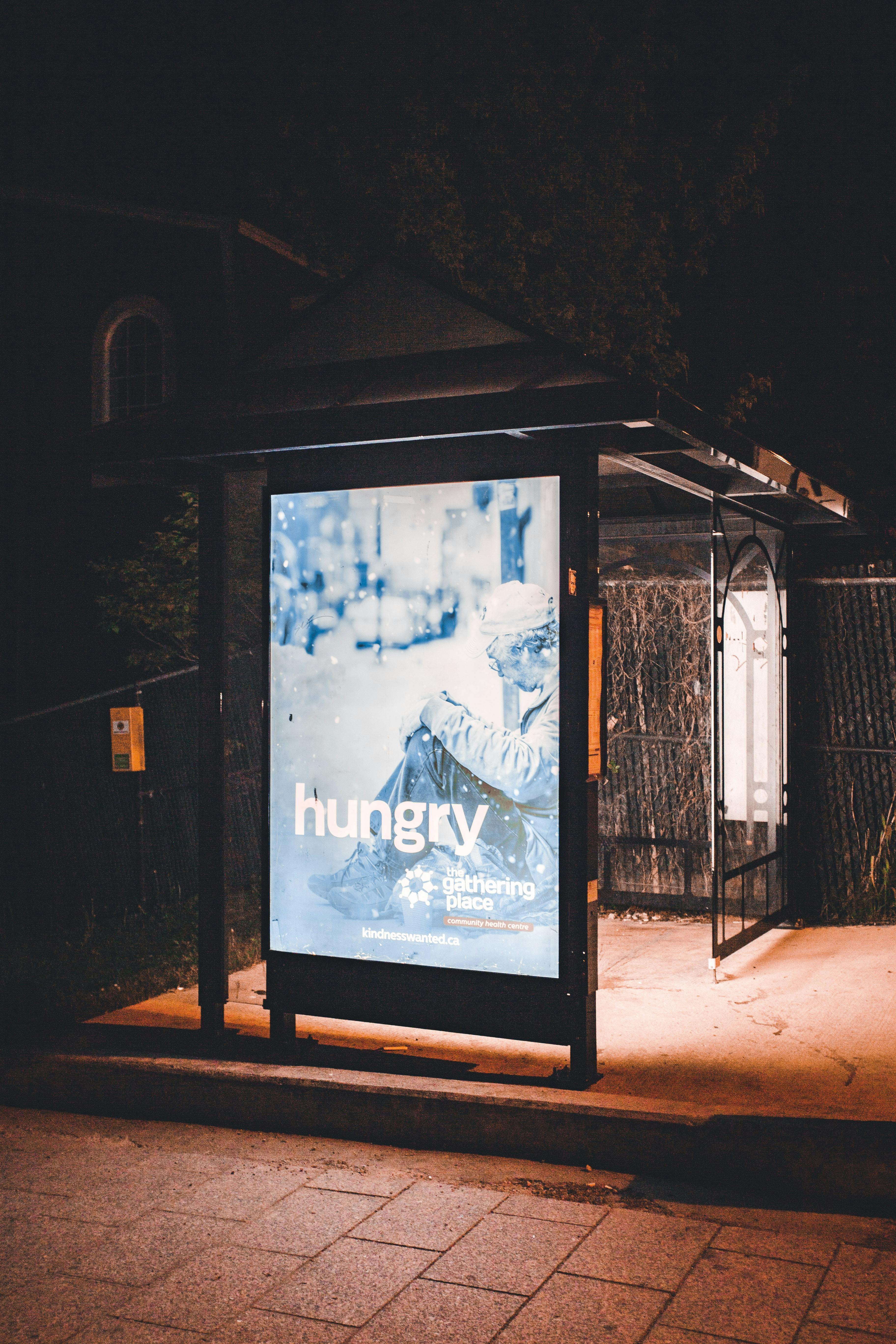 Illuminated Bus Stop During Night Time · Free Stock Photo