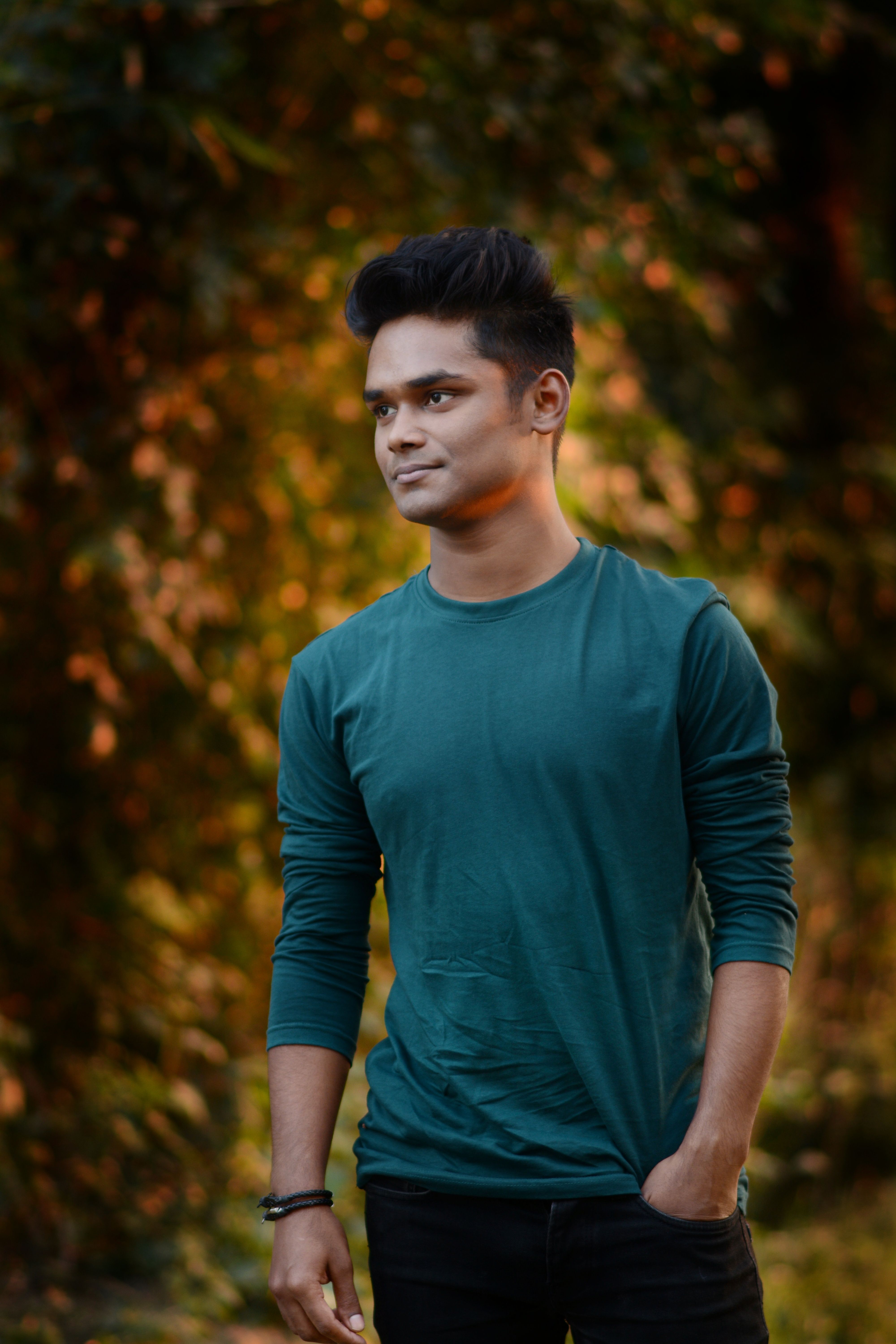 Handsome Man in Teal Colored Long Sleeves · Free Stock Photo