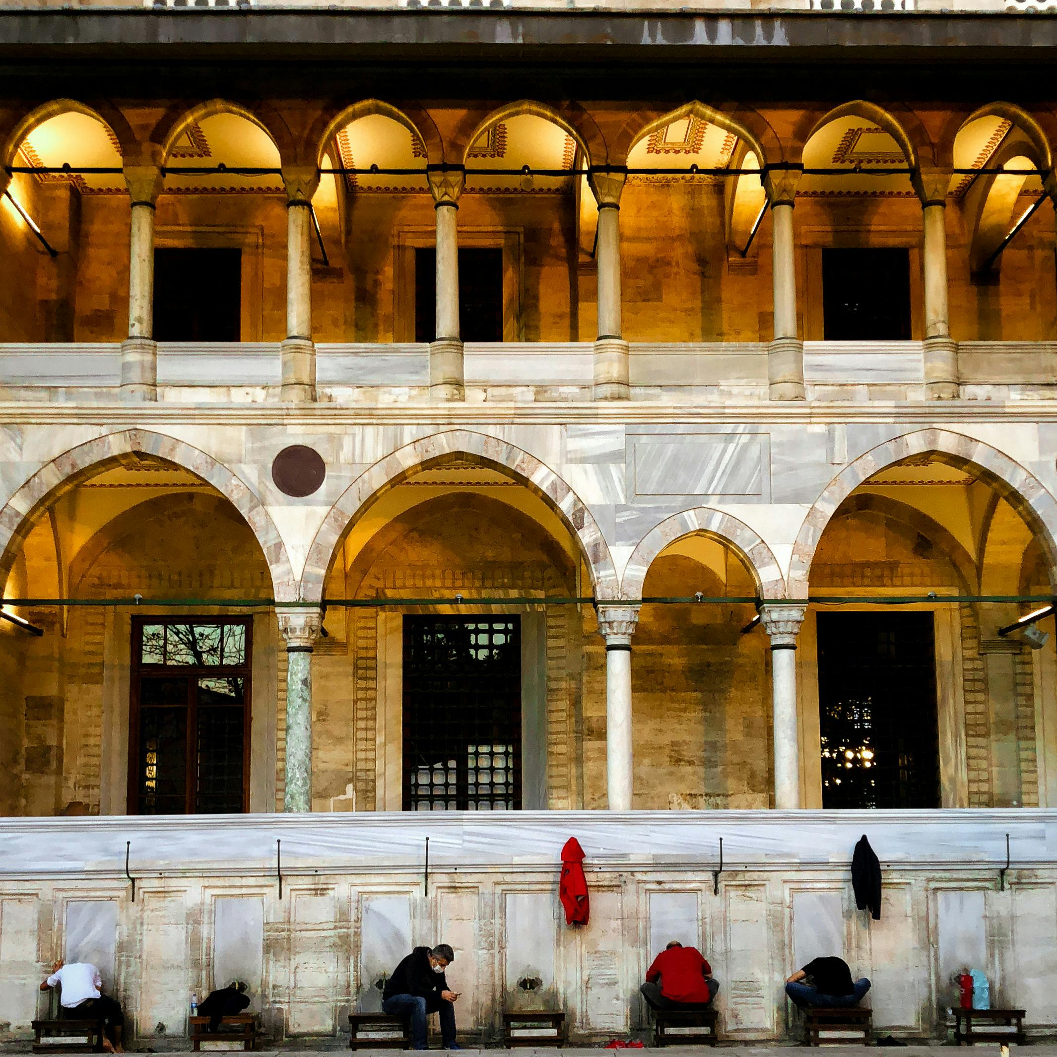 People Praying Beside the Mosque · Free Stock Photo