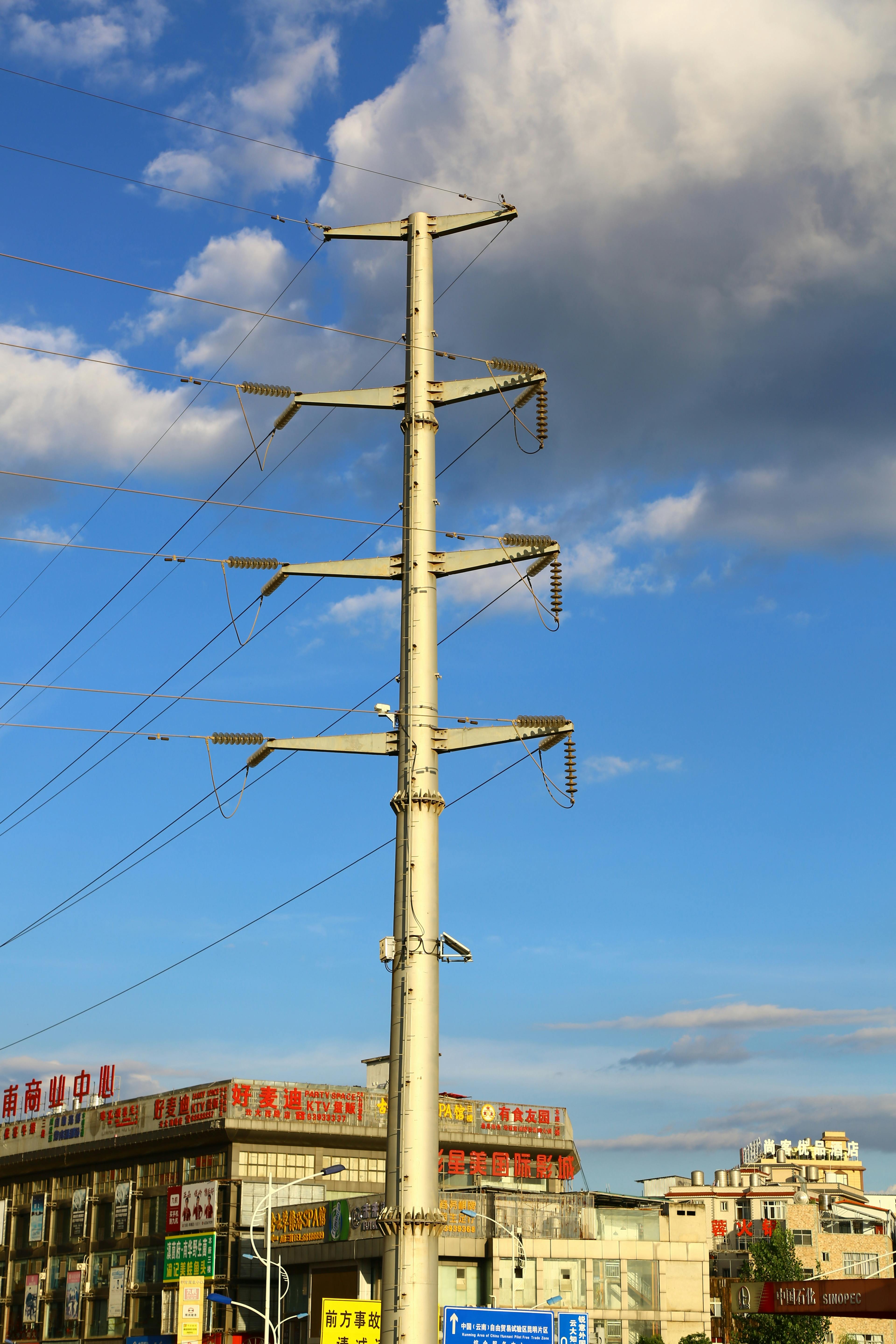 Electric Post and Wires Covered With Snow · Free Stock Photo