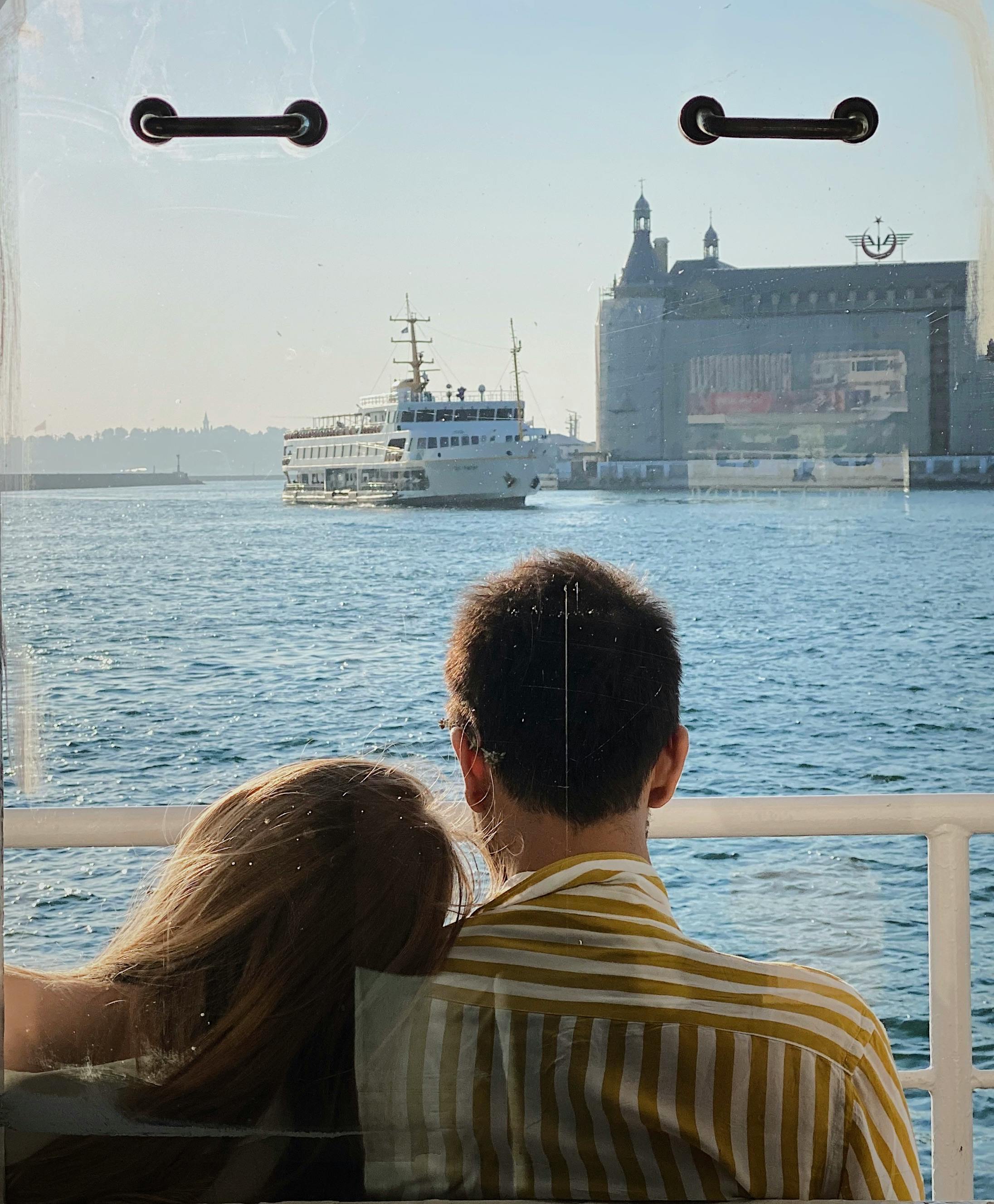 Person Sitting on Ship · Free Stock Photo