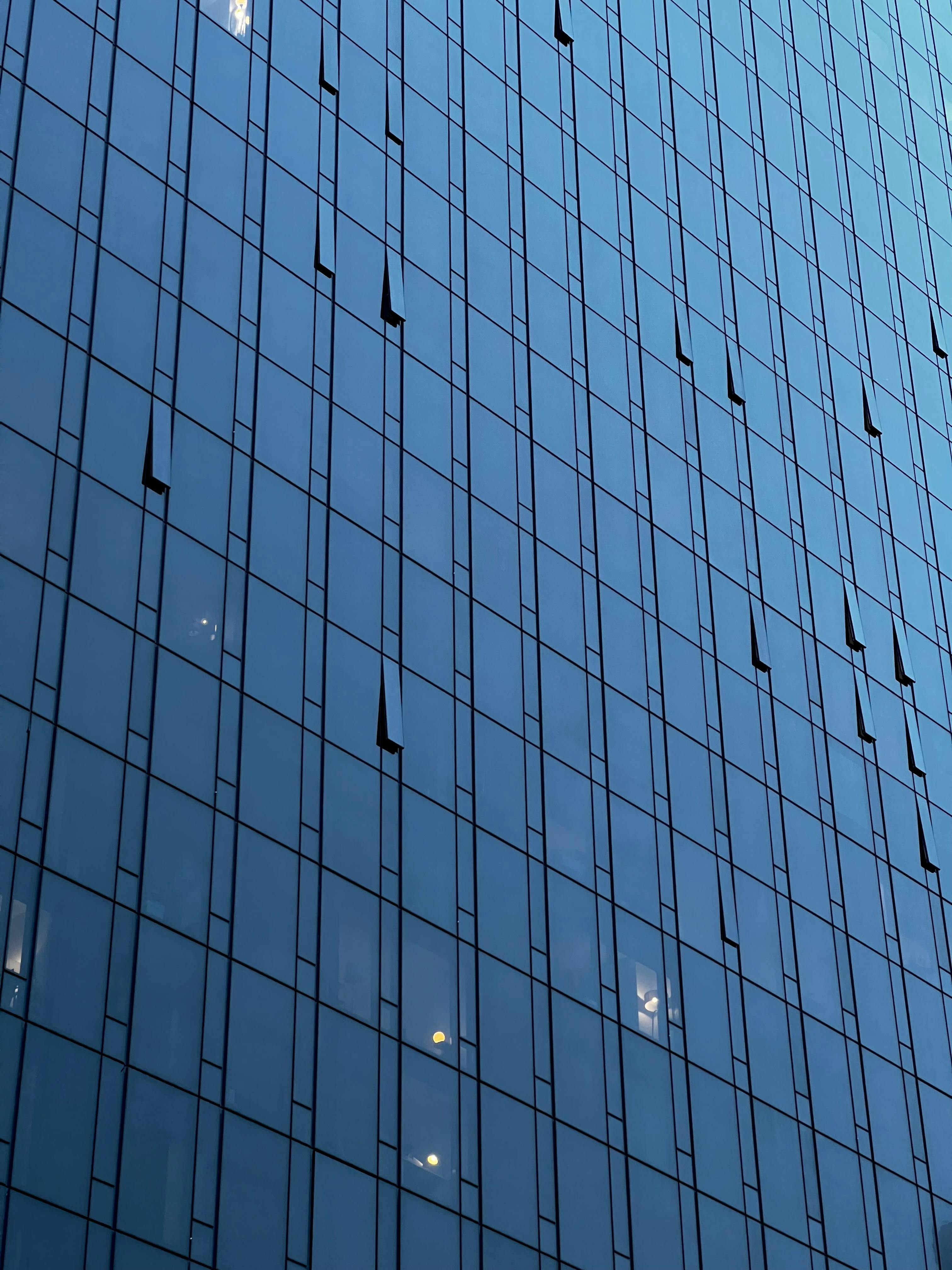 Reflection of a Building on a Glass Buildings · Free Stock Photo