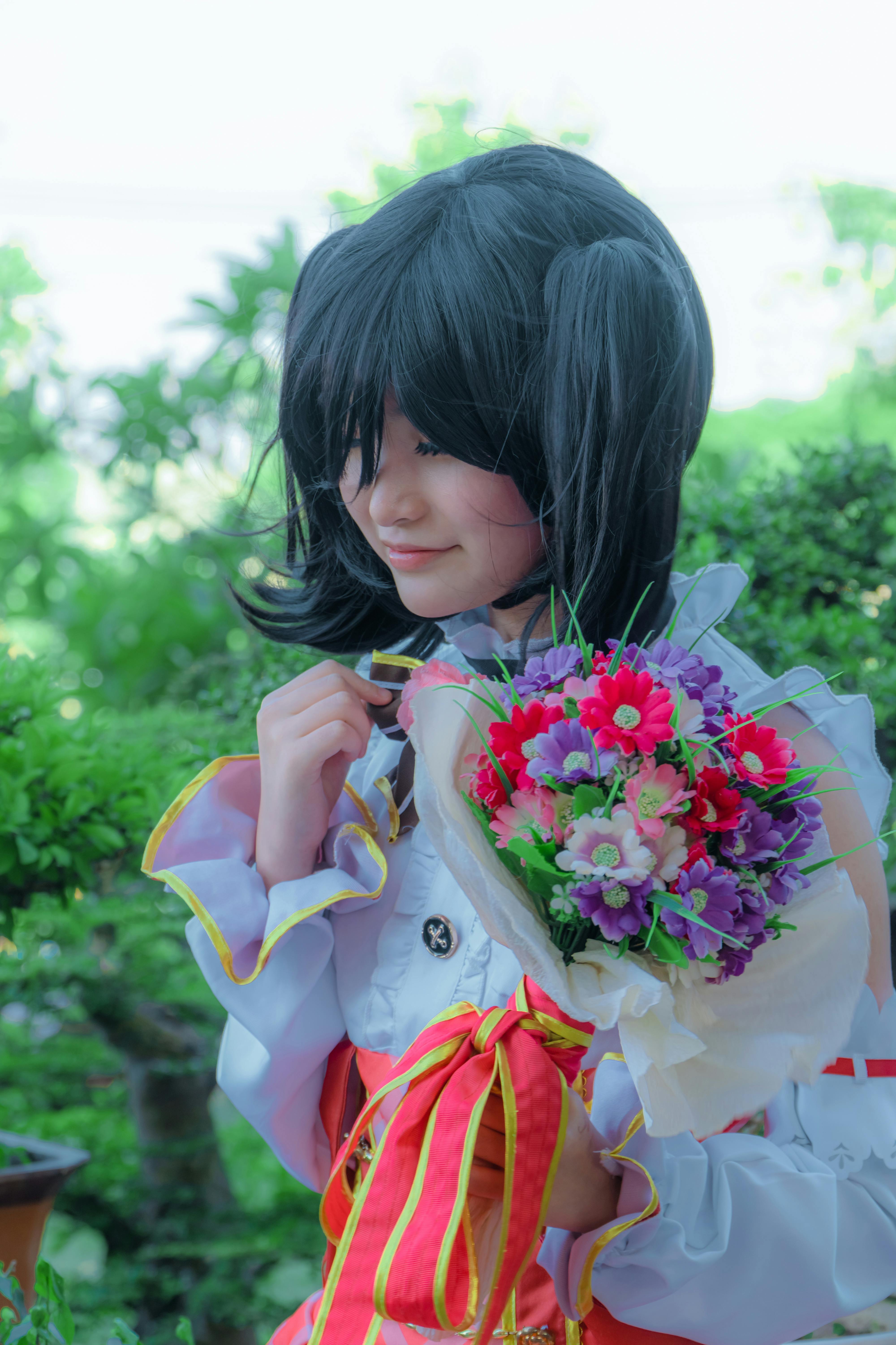 Woman Cosplaying Miku · Free Stock Photo