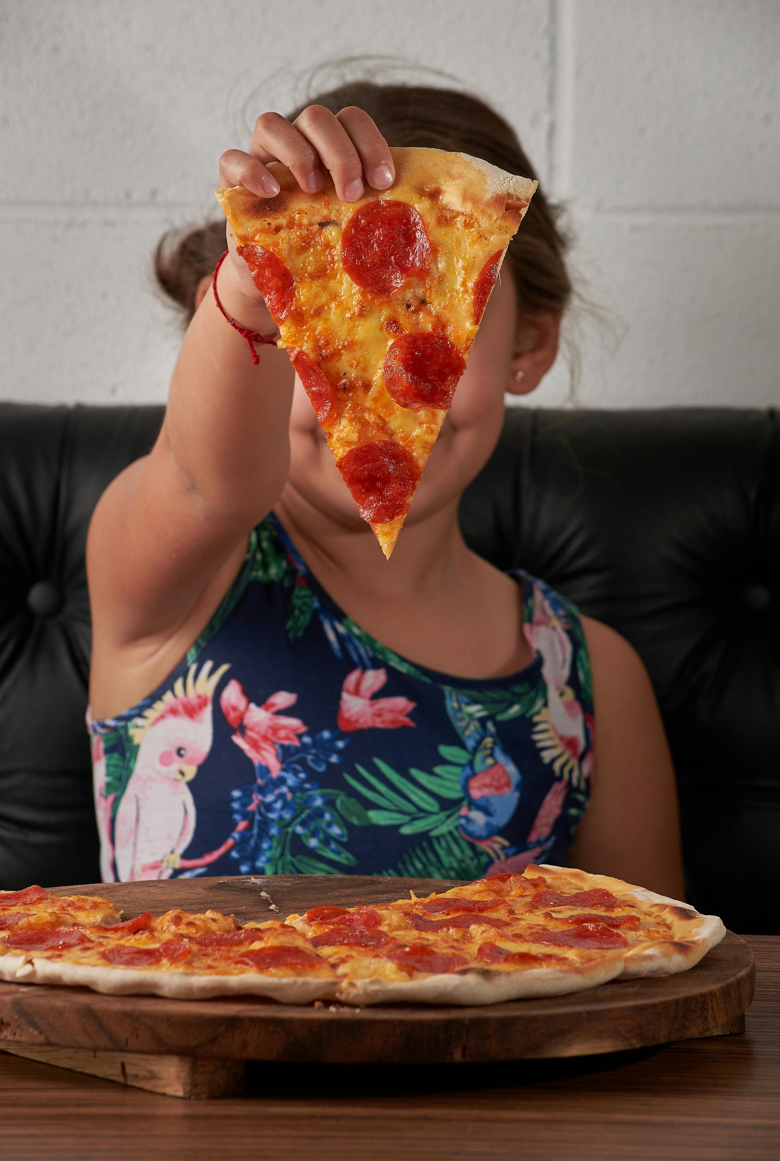 Pizza Slices on Pink Background · Free Stock Photo