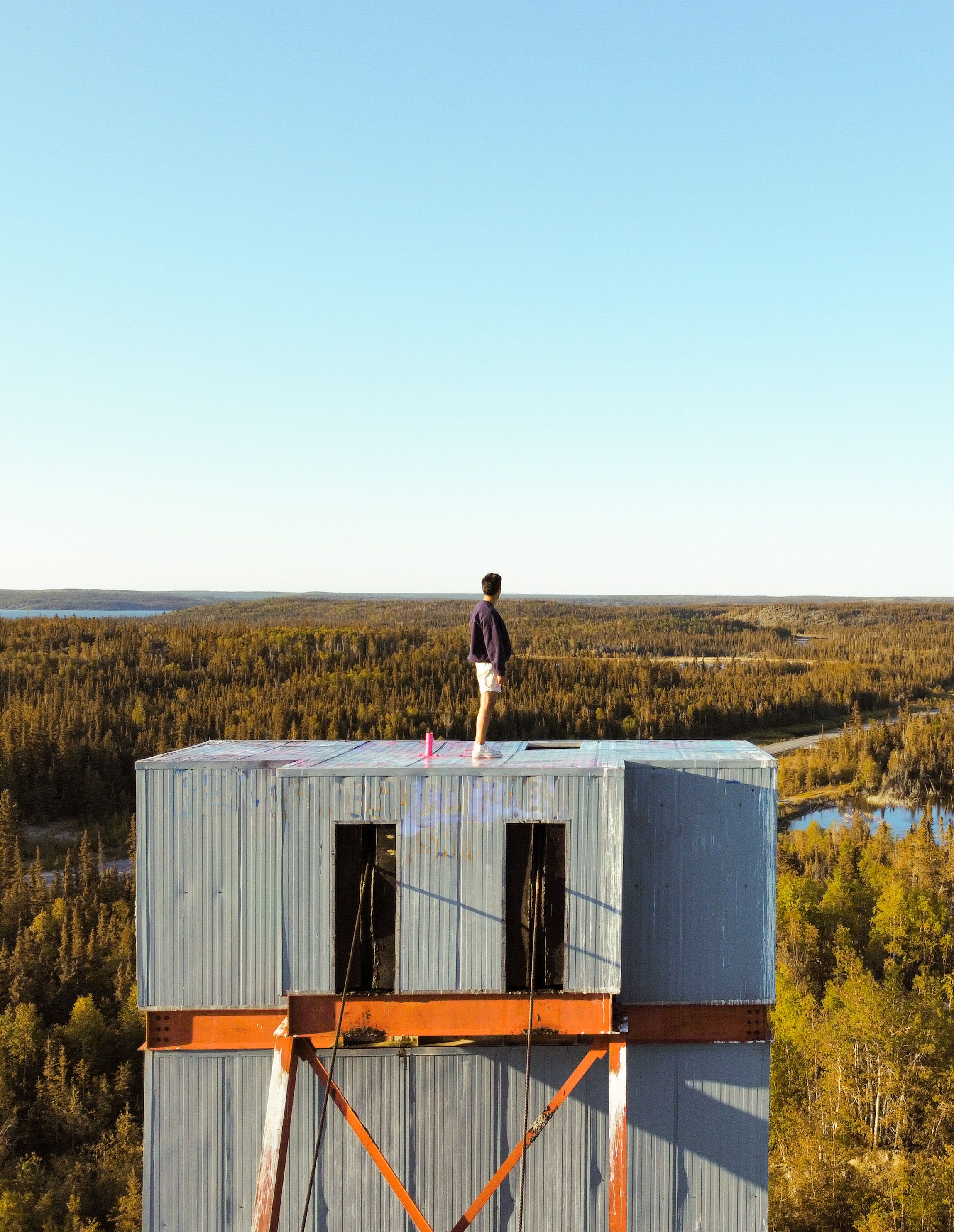 A Man Standing on the Roof · Free Stock Photo