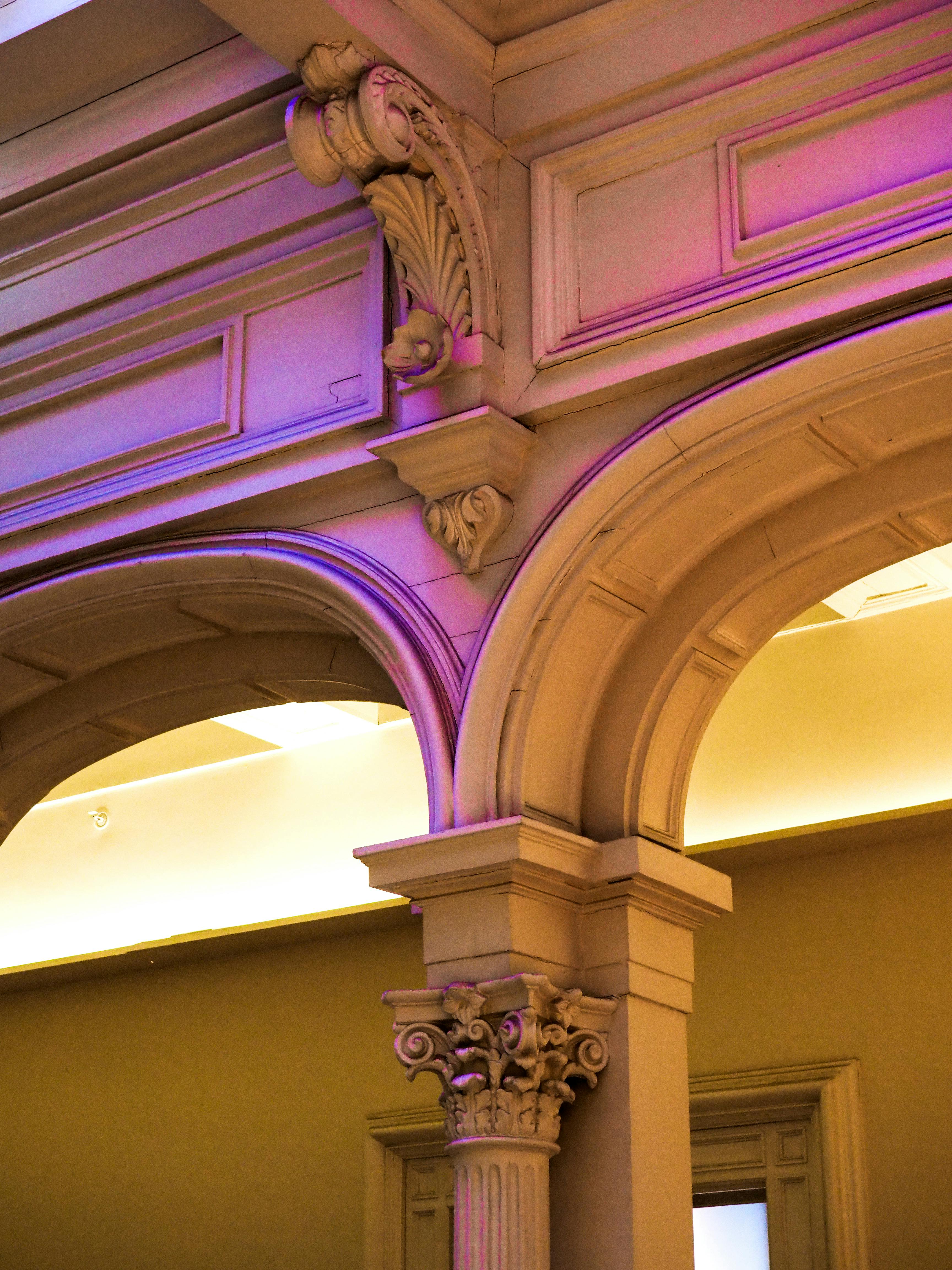 Column with Capital and Arch · Free Stock Photo