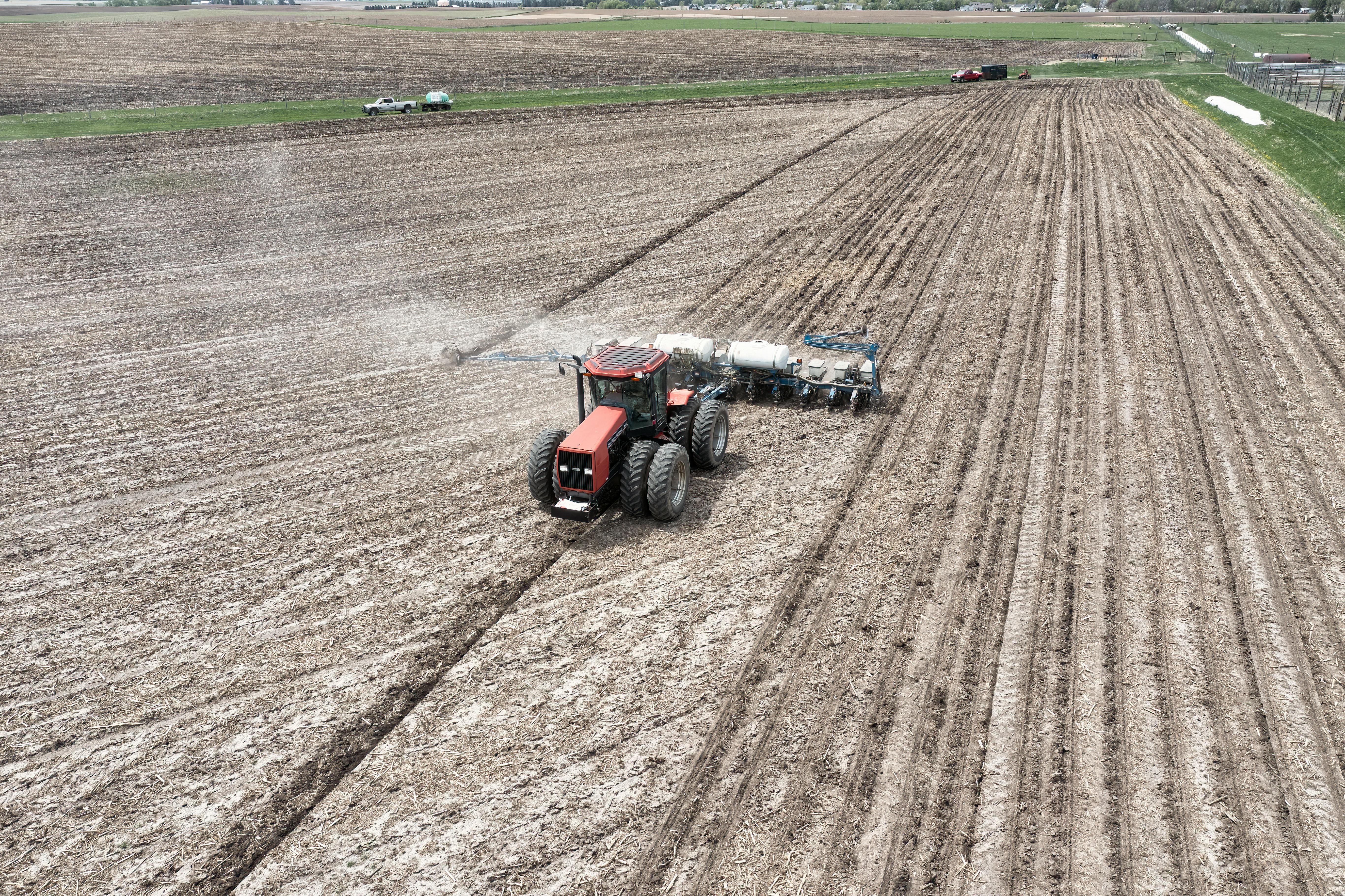 A Tractor Plowing the Field · Free Stock Photo
