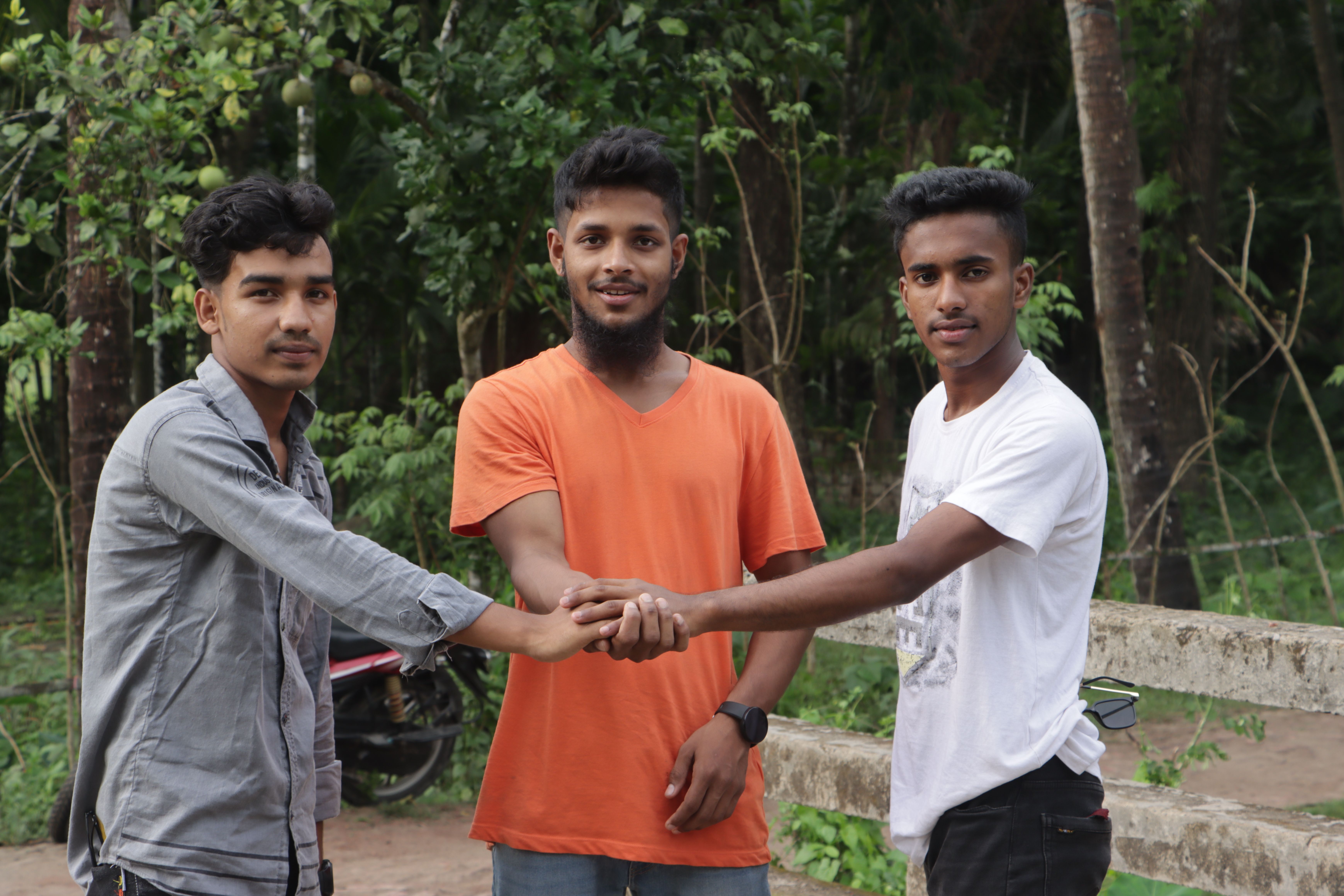 Three Young Men Standing Together · Free Stock Photo