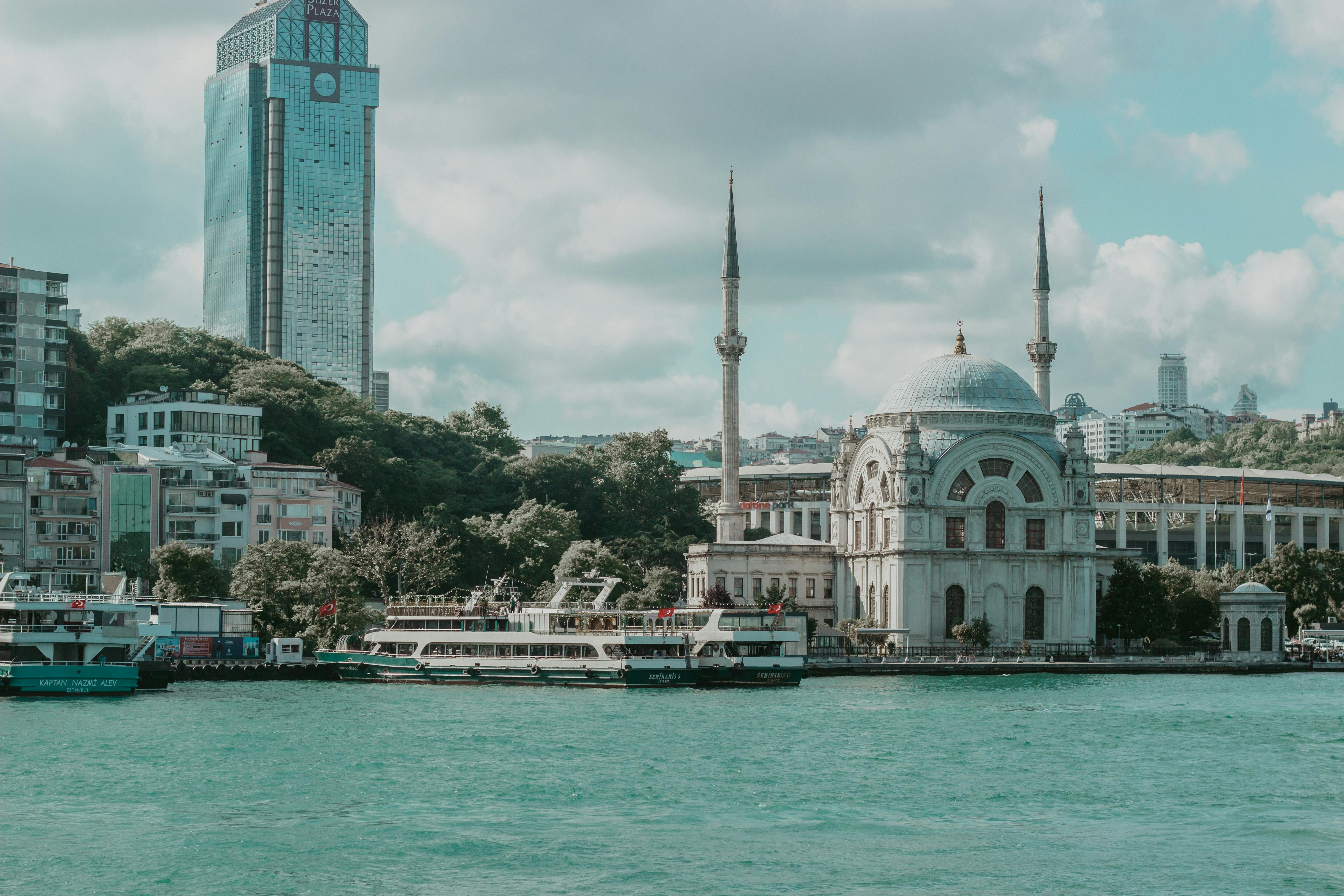 Concrete Buildings Beside the Sea · Free Stock Photo