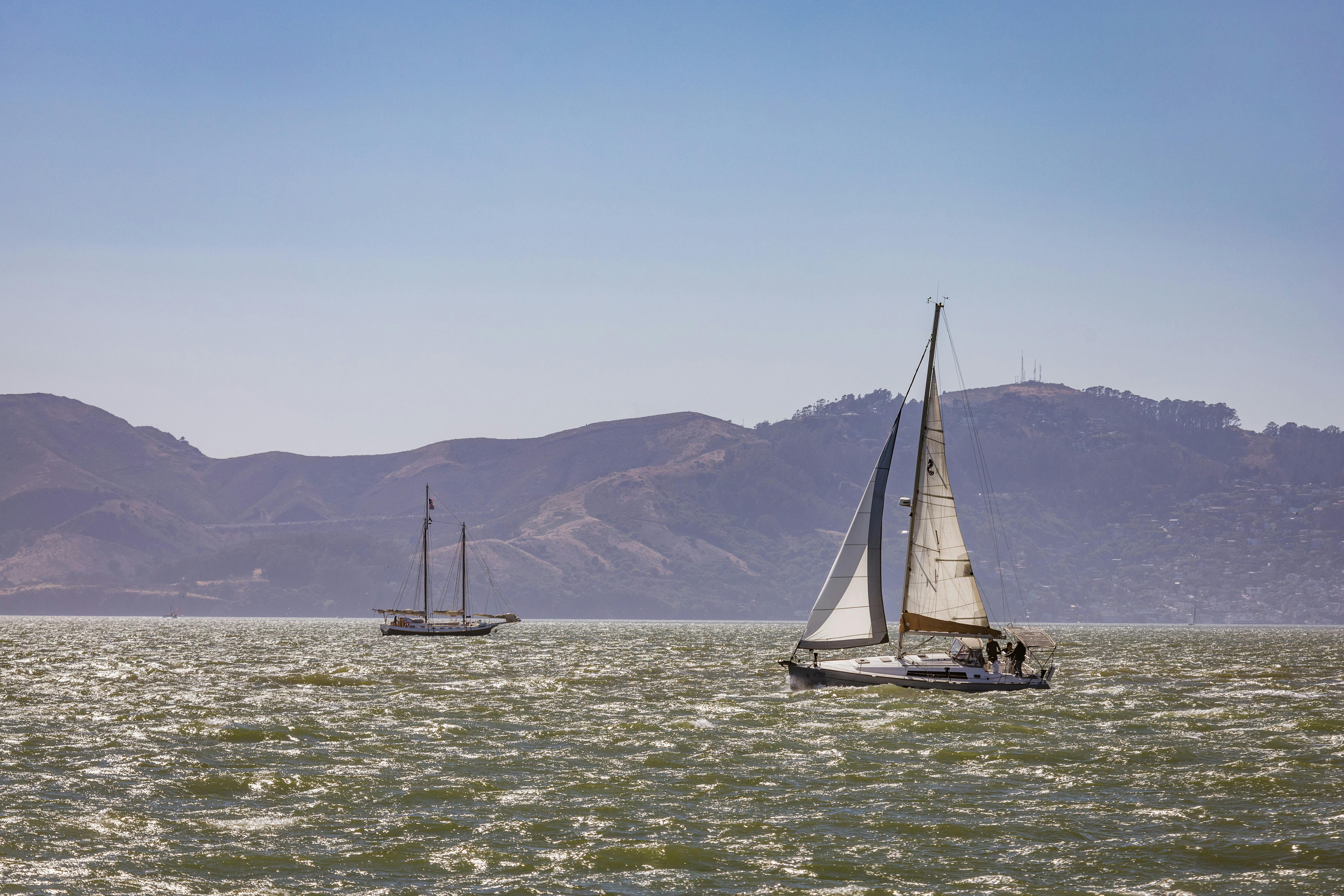 Sailing Boat on Body of Water · Free Stock Photo